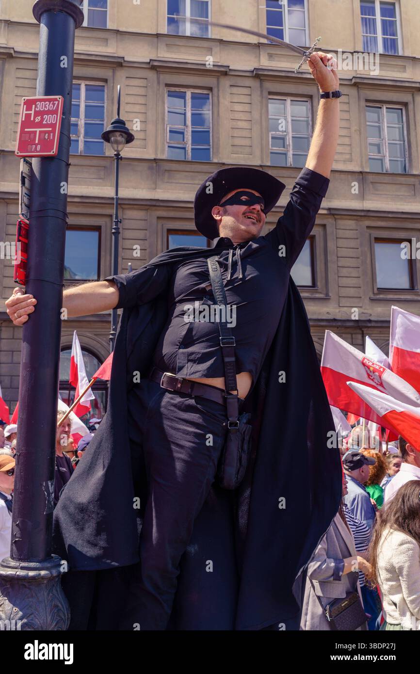 March in support of Karol Nawrocki People in Zorro costumes at a rally ...
