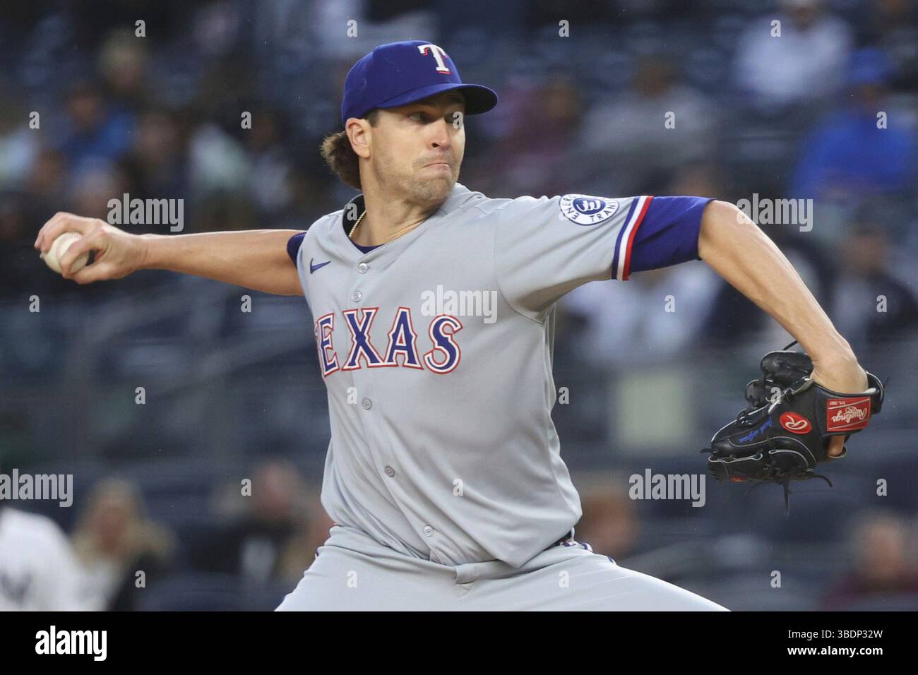 Texas Rangers pitcher Jacob deGrom throws the ball during the first ...