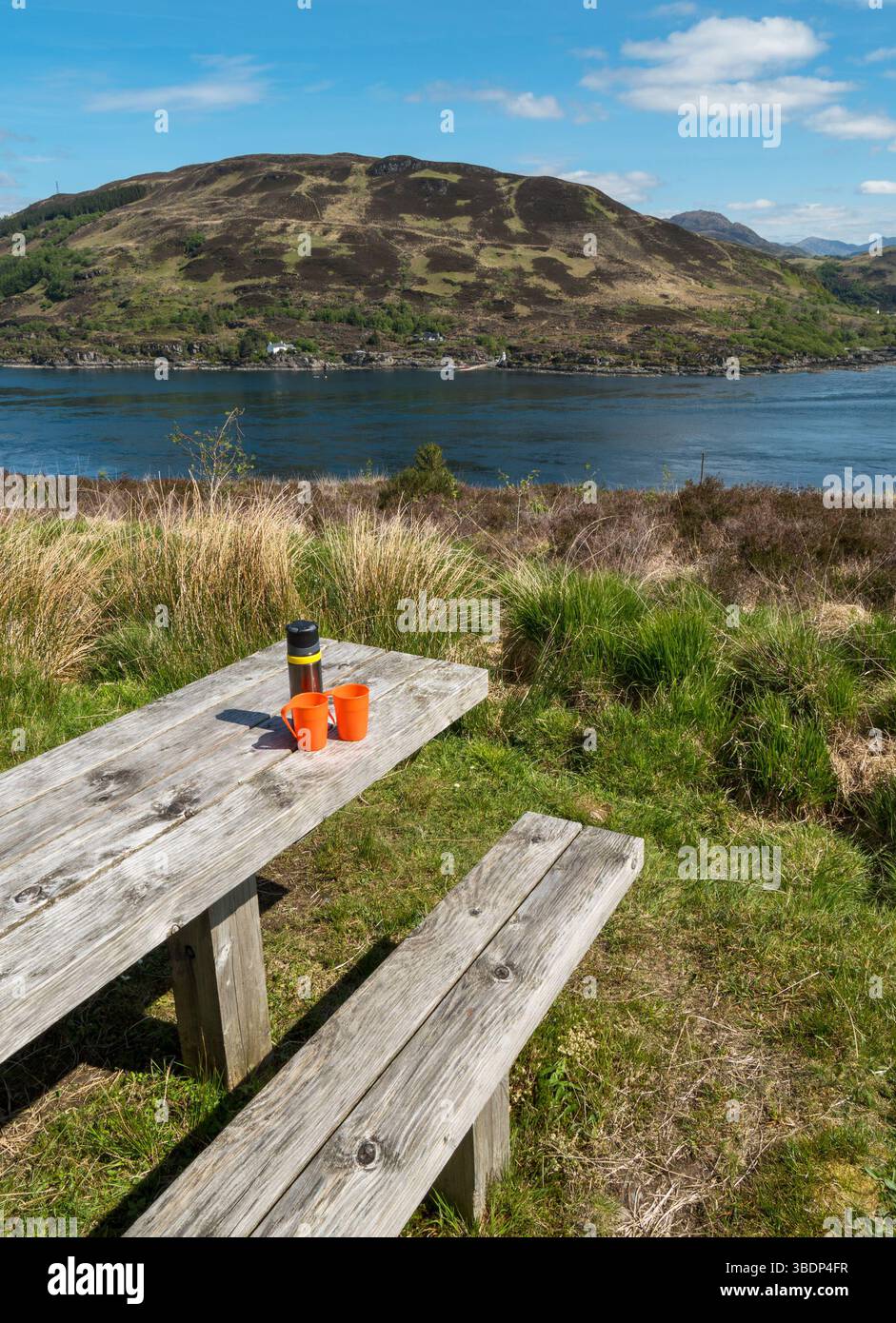 Wooden picnic table with a view from Kylerhea on the Isle of Skye over ...