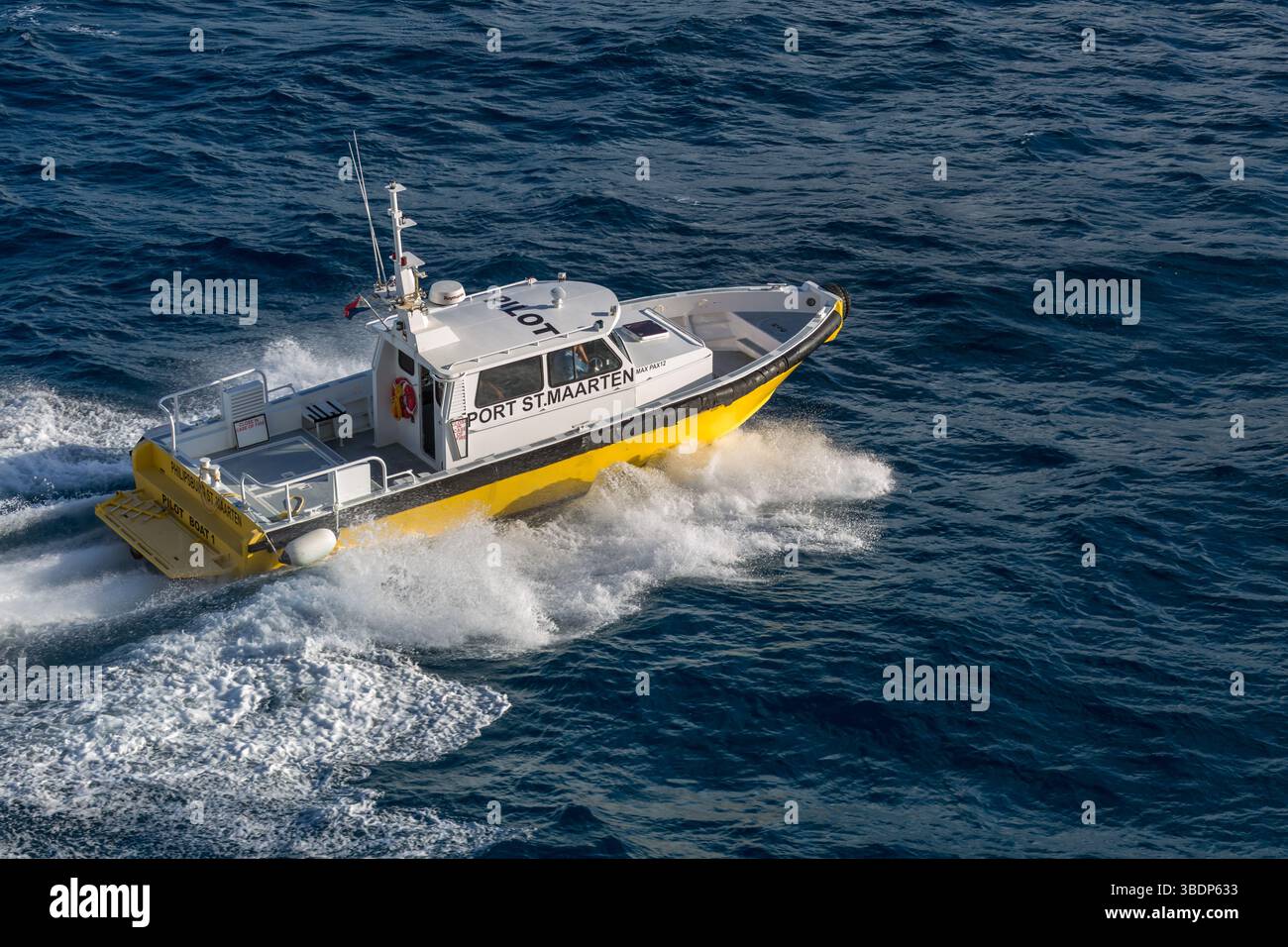 Pilot boat in the Caibbean Sea being positioned to bring the harbor ...
