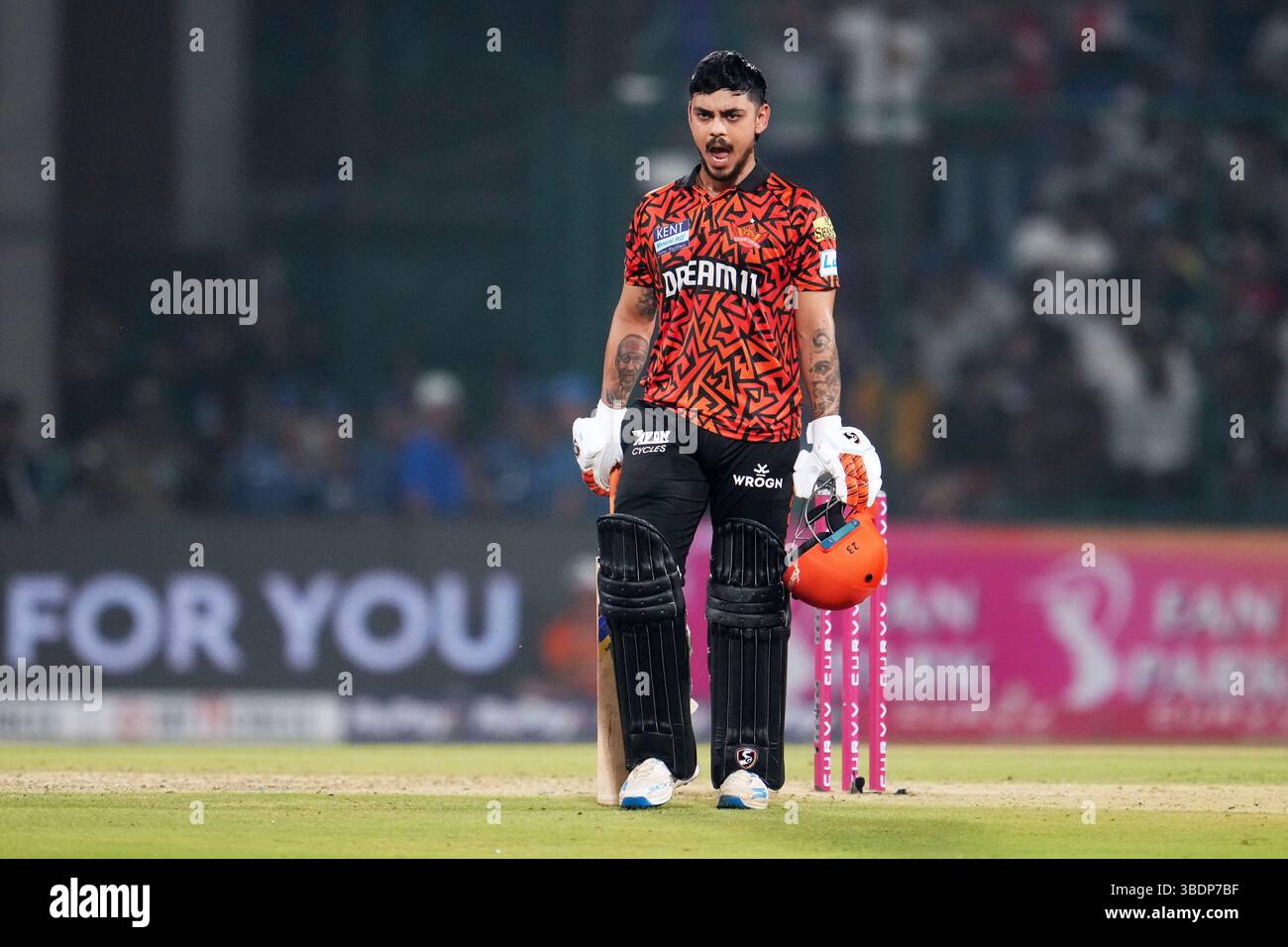 Sunrisers Hyderabad's Ishan Kishan moves his jaw after he was hit by ...