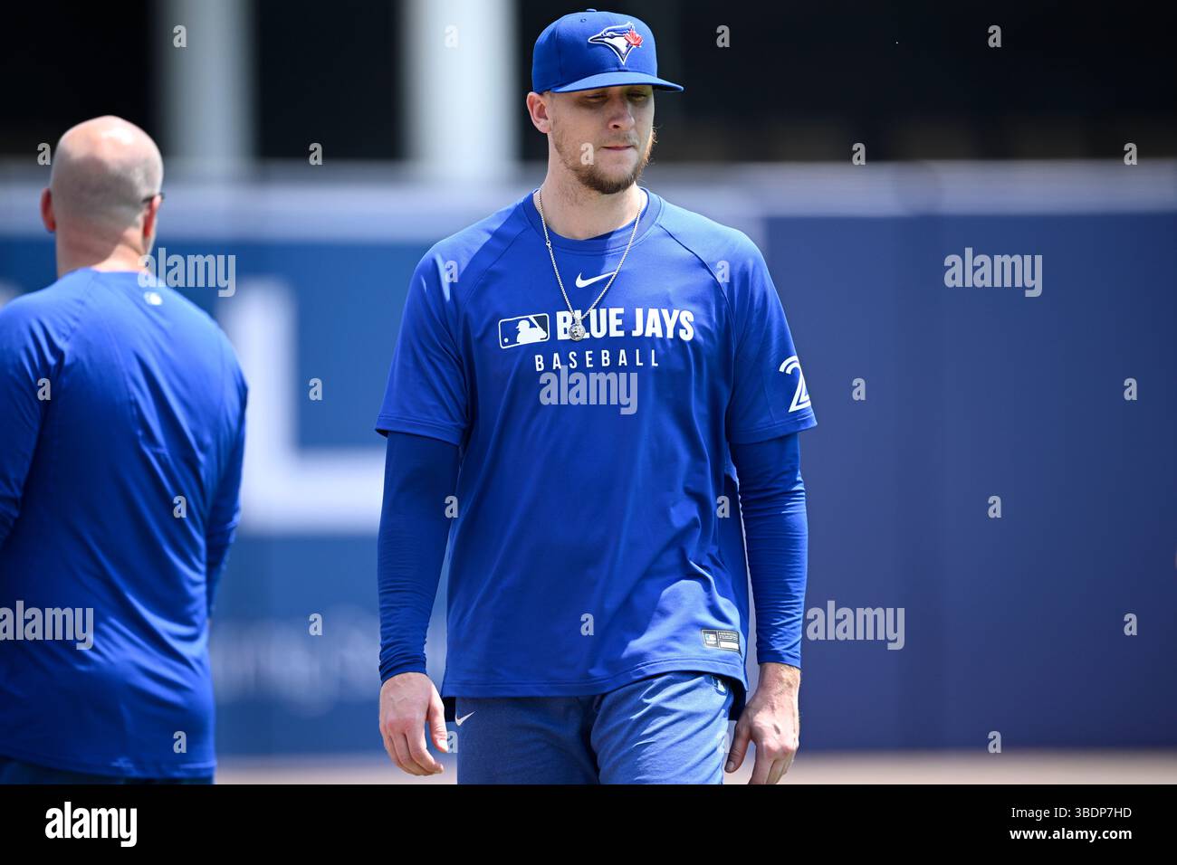 Toronto Blue Jays pitcher Jeff Hoffman warms up before a baseball game ...