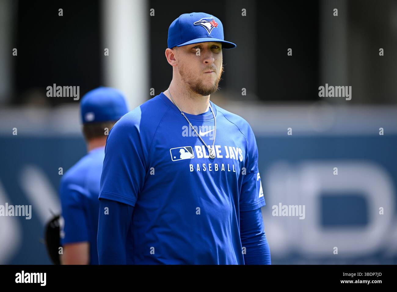 Toronto Blue Jays pitcher Jeff Hoffman warms up before a baseball game ...