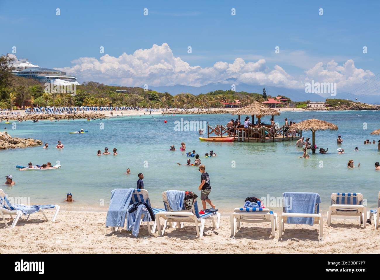 Royal Caribbean Allure of the Seas cruise passengers on floating beach ...