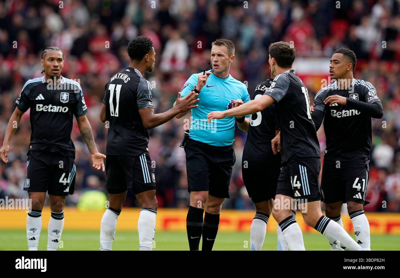 Manchester, UK. 25th May, 2025. Aston Villa players surround referee ...