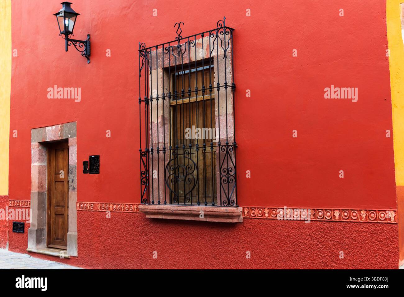 San Miguel de Allende, Mexico - May 28th 2016: A window with iron bars ...