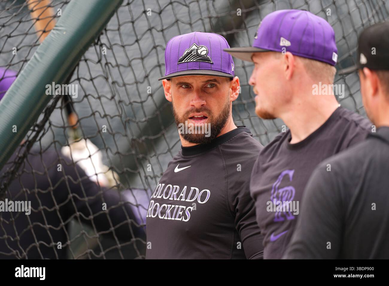 Colorado Rockies outfielder Nick Martini (35) warms up before a ...