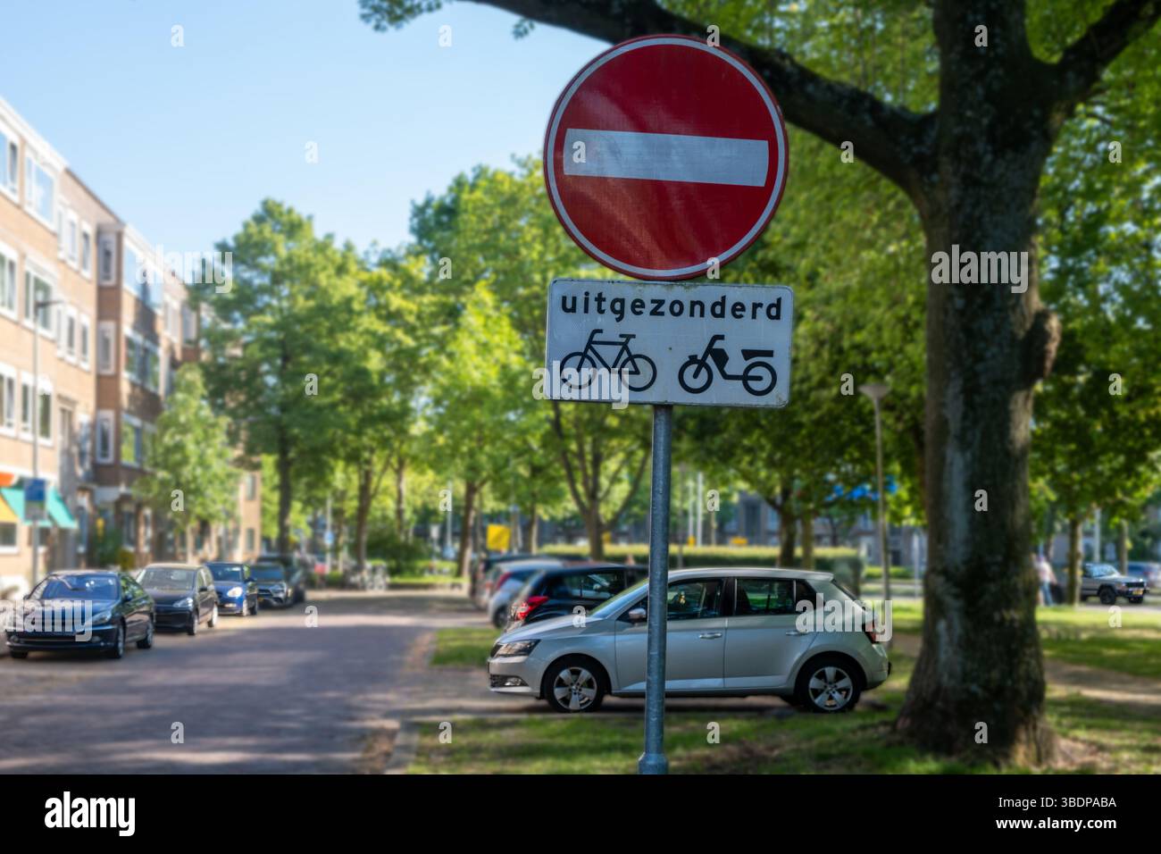 NO ENTRY traffic sign in Rotterdam city.Bikes, moto excluded dutch text ...