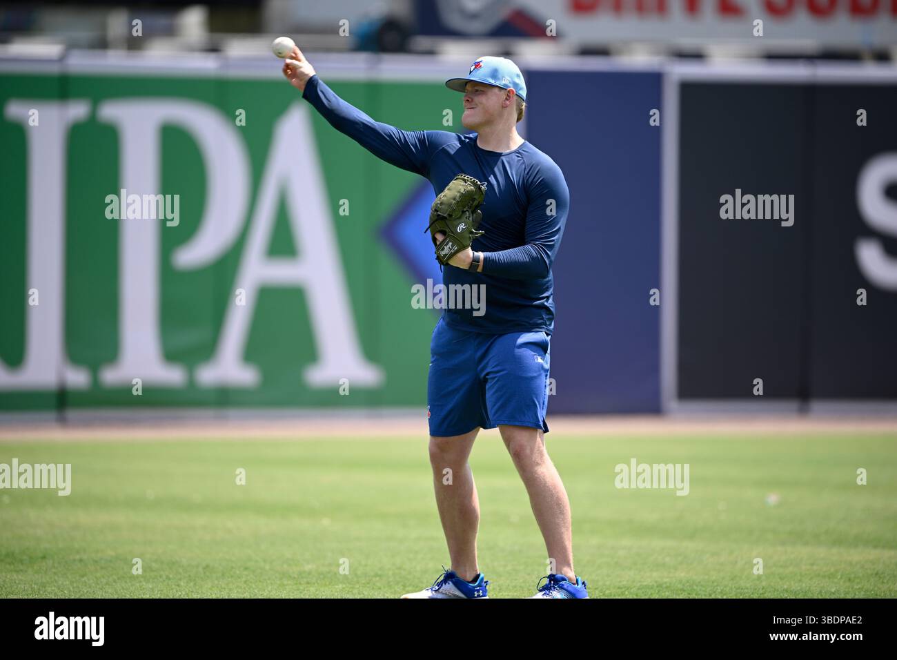 Toronto Blue Jays pitcher Paxton Schultz warms up before a baseball ...