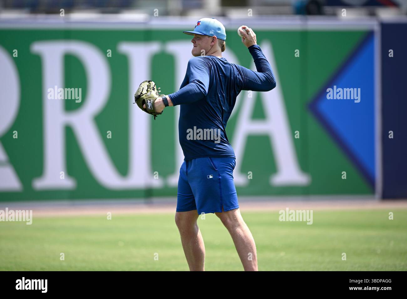 Toronto Blue Jays pitcher Paxton Schultz warms up before a baseball ...