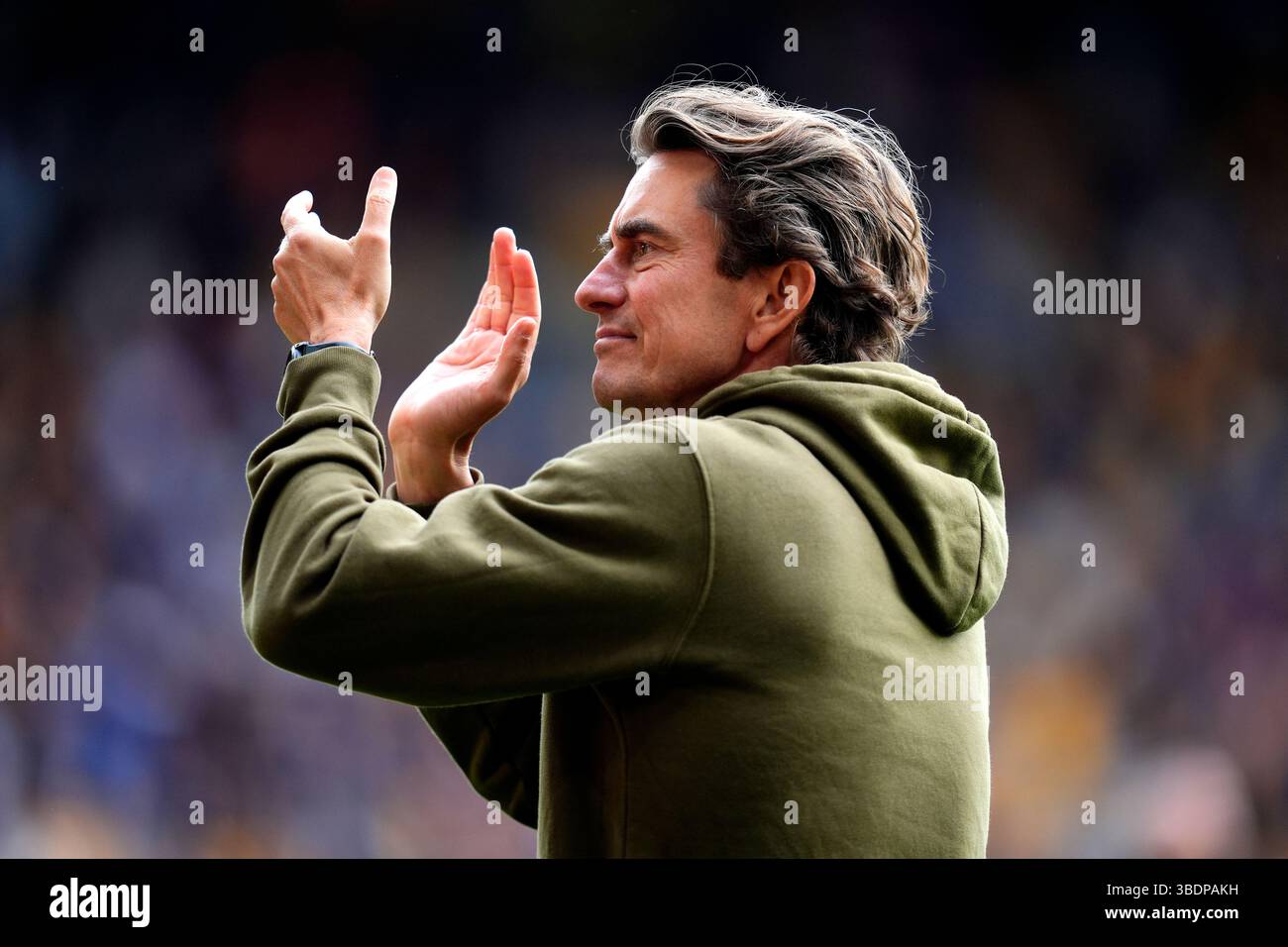 Brentford manager Thomas Frank applauds the fans after the Premier ...
