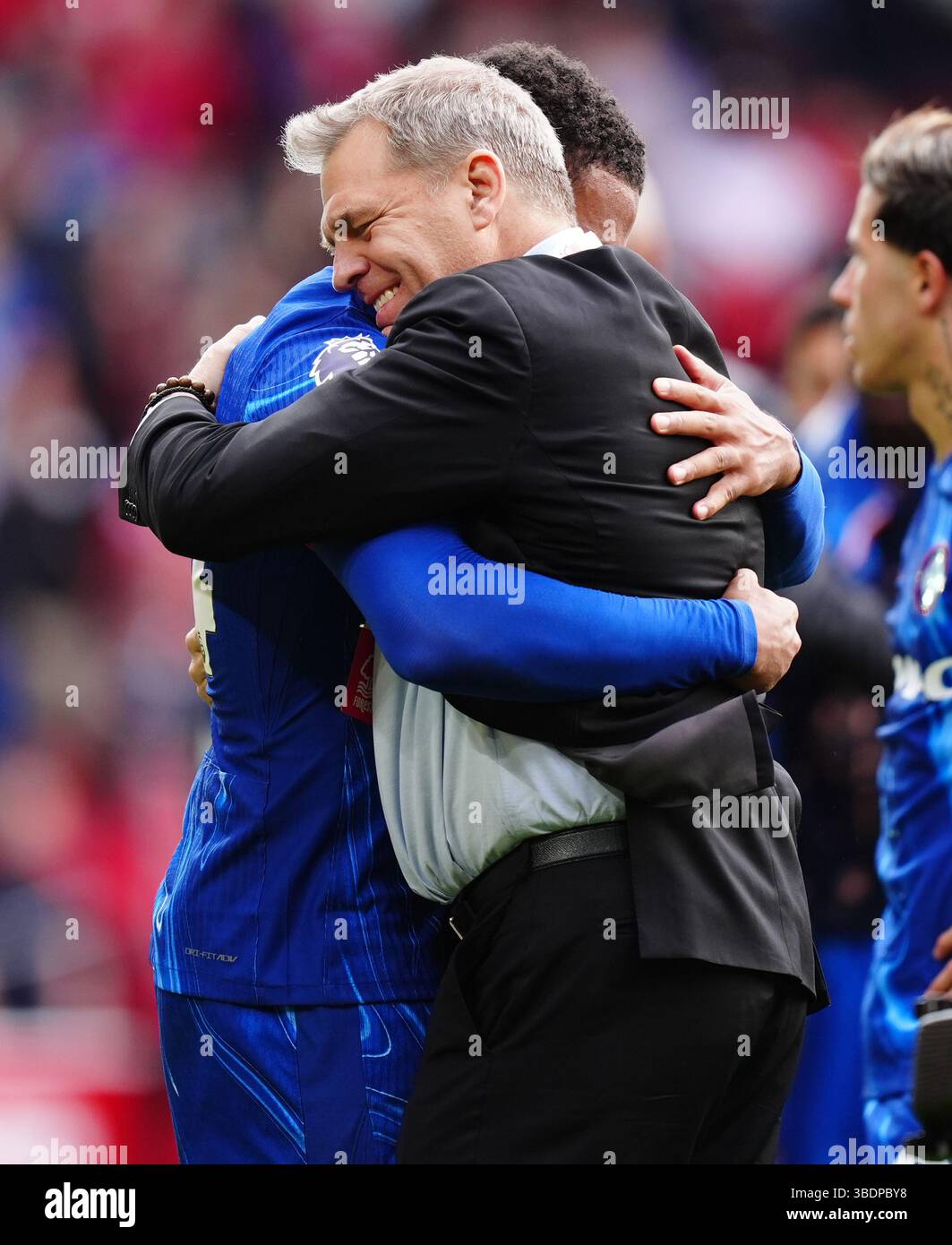 Chelsea owner Todd Boehly celebrates with Reece James following the ...