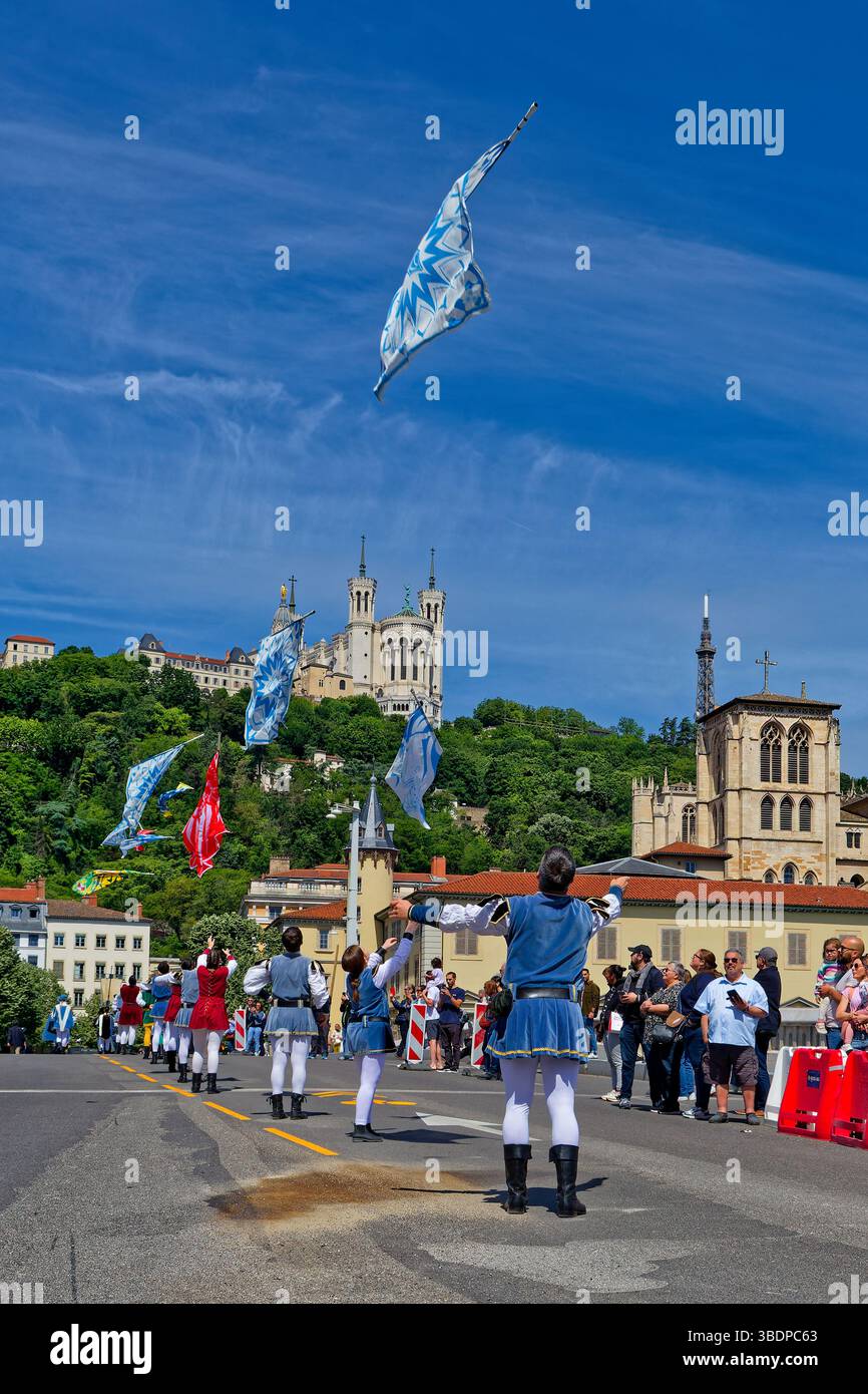 LYON, FRANCE, May 25, 2025 : The italian flag-throwers of Asti lead the ...