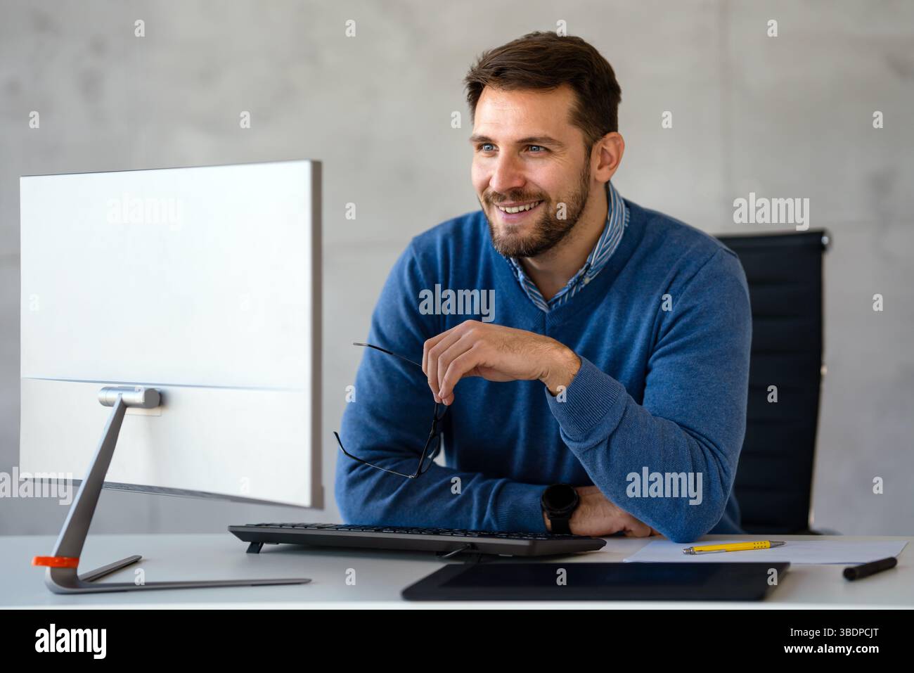 Successful busy professional business man working on computer sitting ...