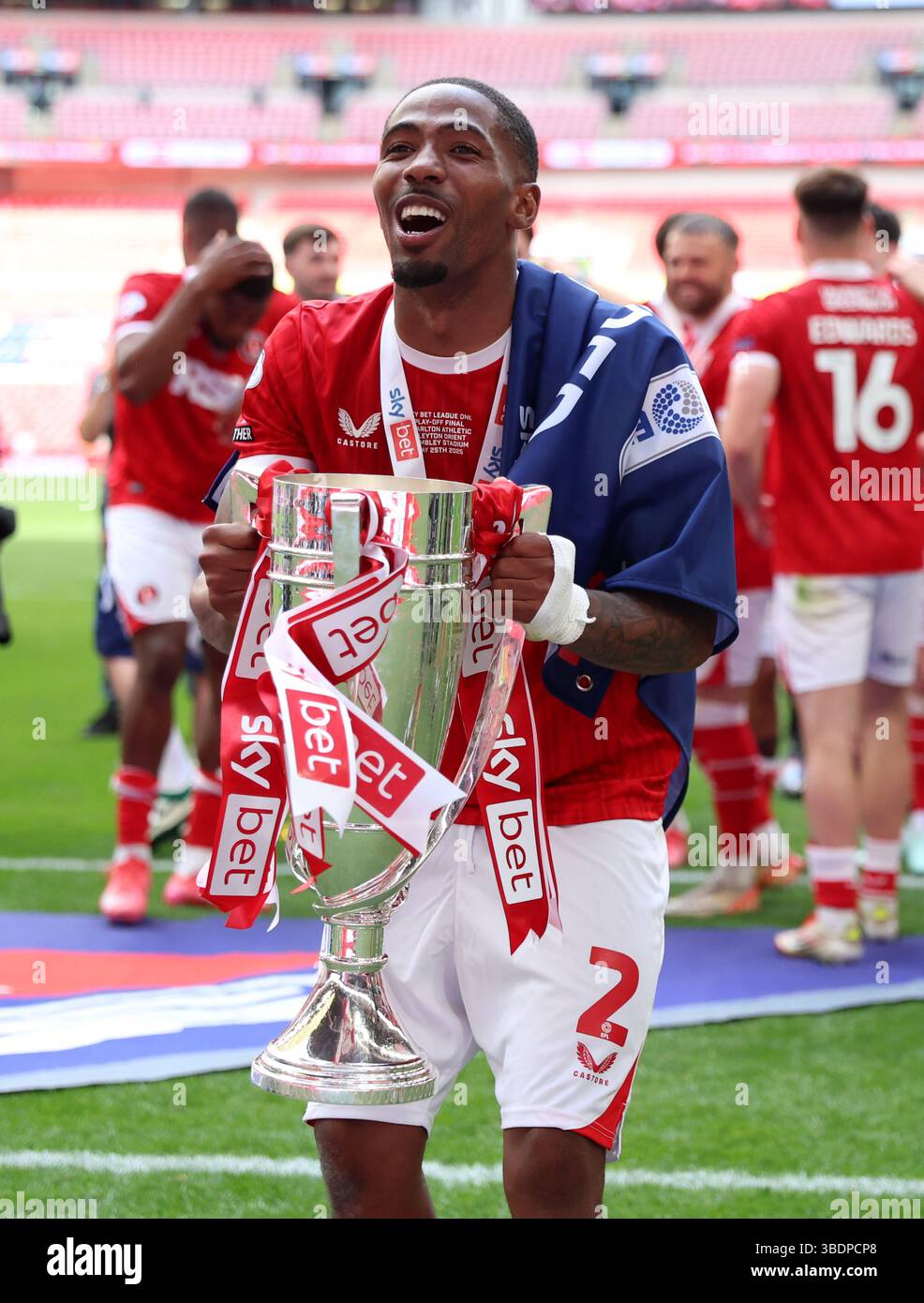 Charlton Athletic's Kayne Ramsay with the trophy after winning the Sky ...