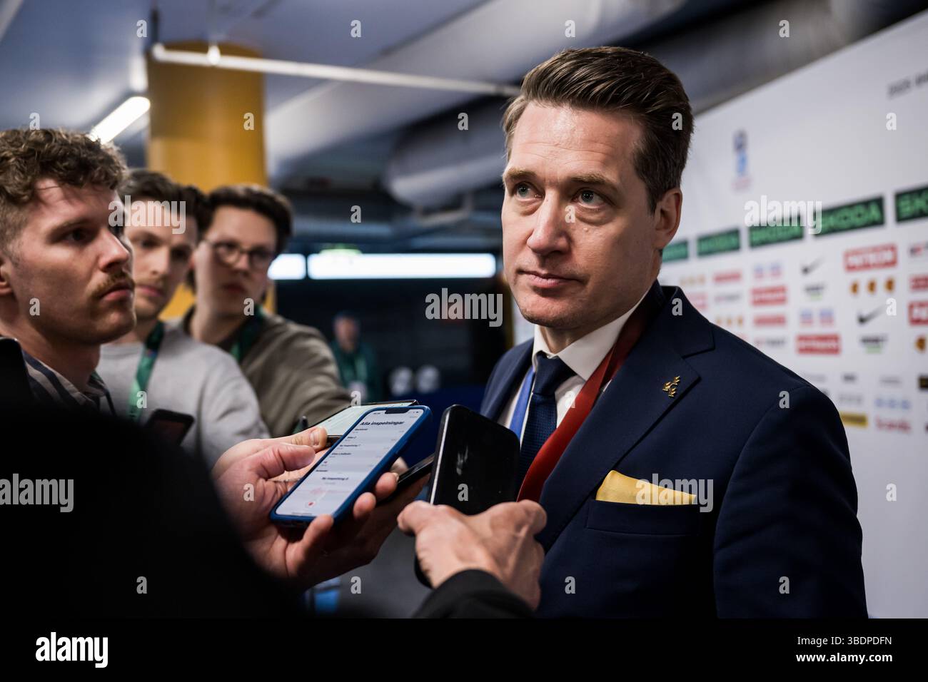 Head coach Sam Hallam of, Sweden. , . is being interviewed in the mixed ...