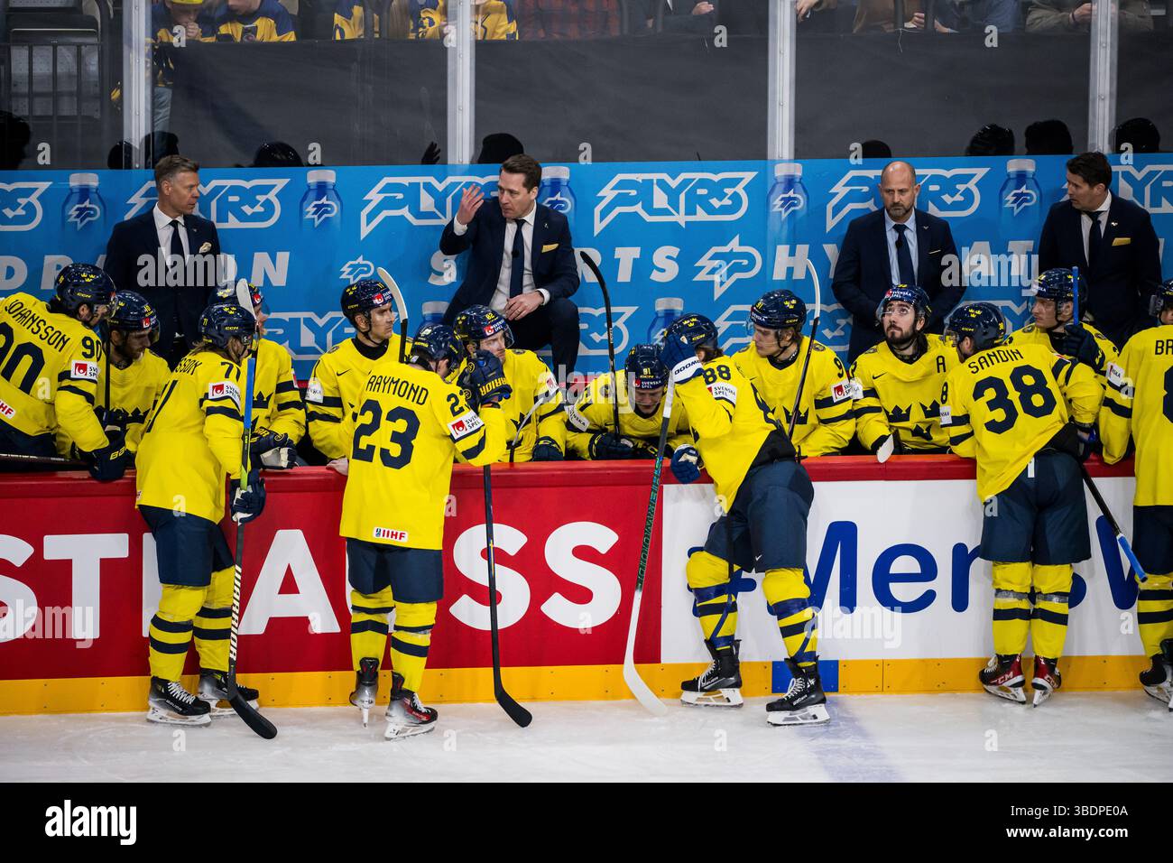 Head coach Sam Hallam of, Sweden. , . during the 2025 IIHF Ice Hockey World Championship bronze ...