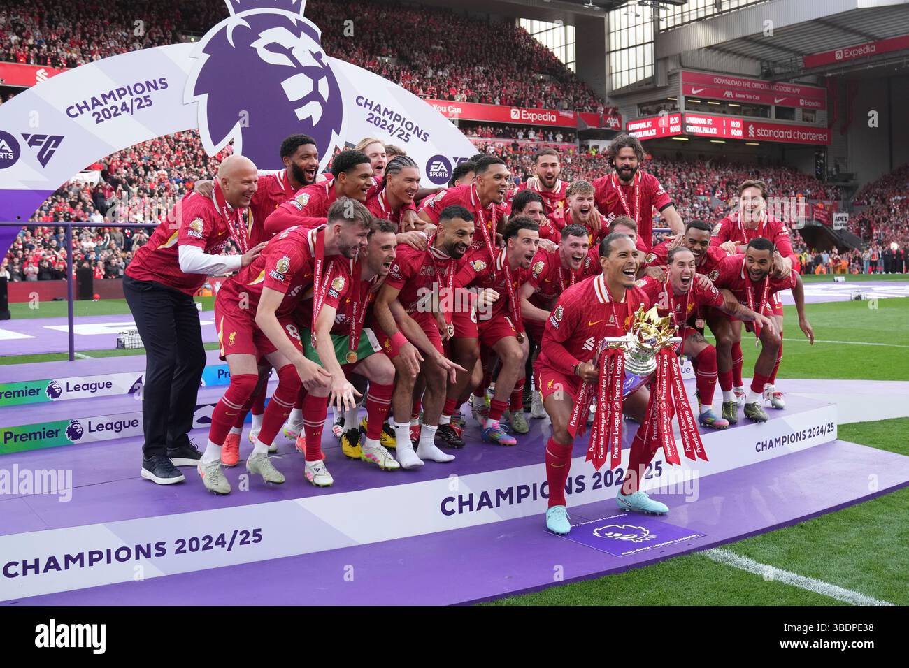 Liverpool players celebrate with the winner's trophy after the English ...