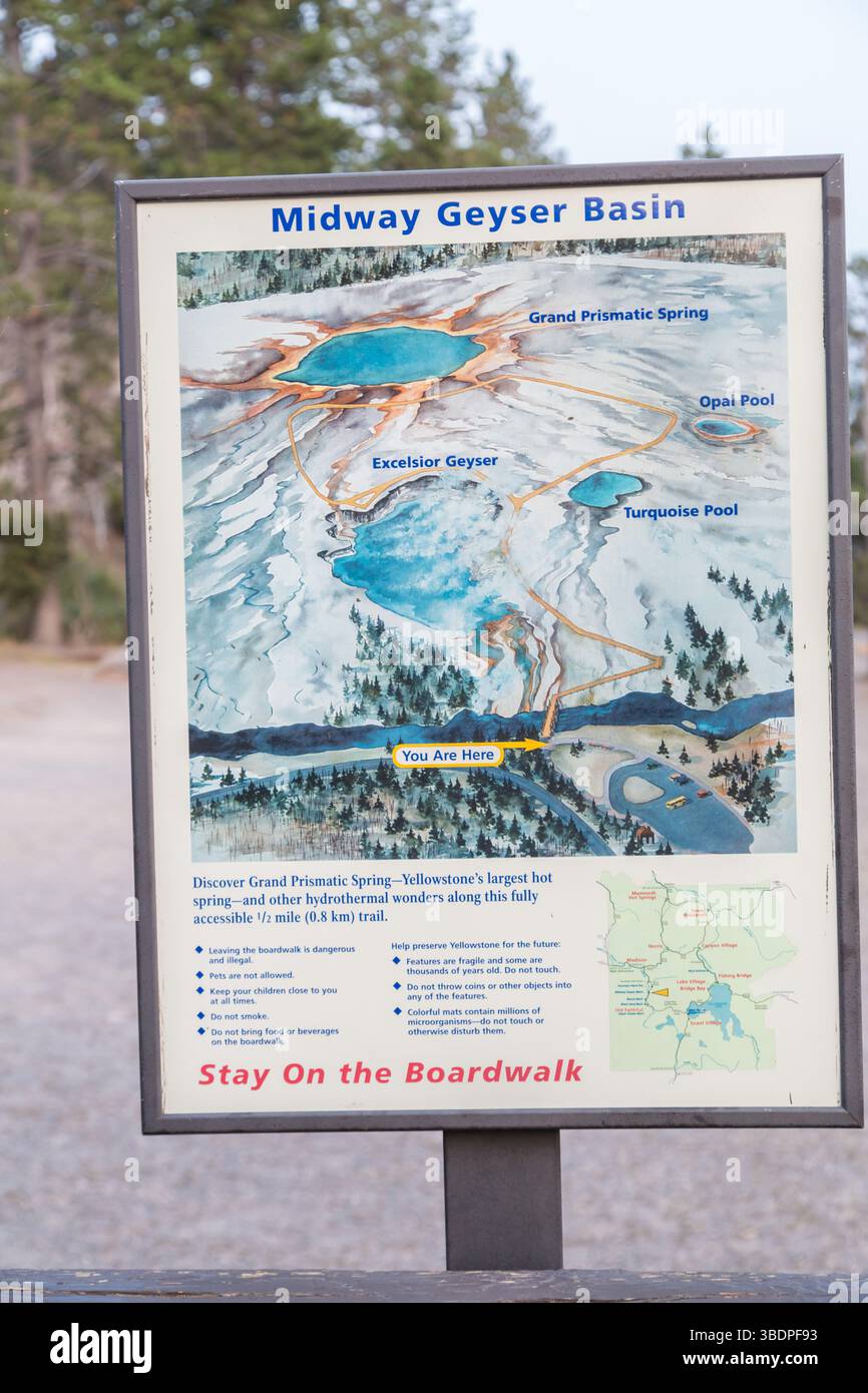 Sign at Midway Geyser Basin shows map of area and instructs visitors to ...