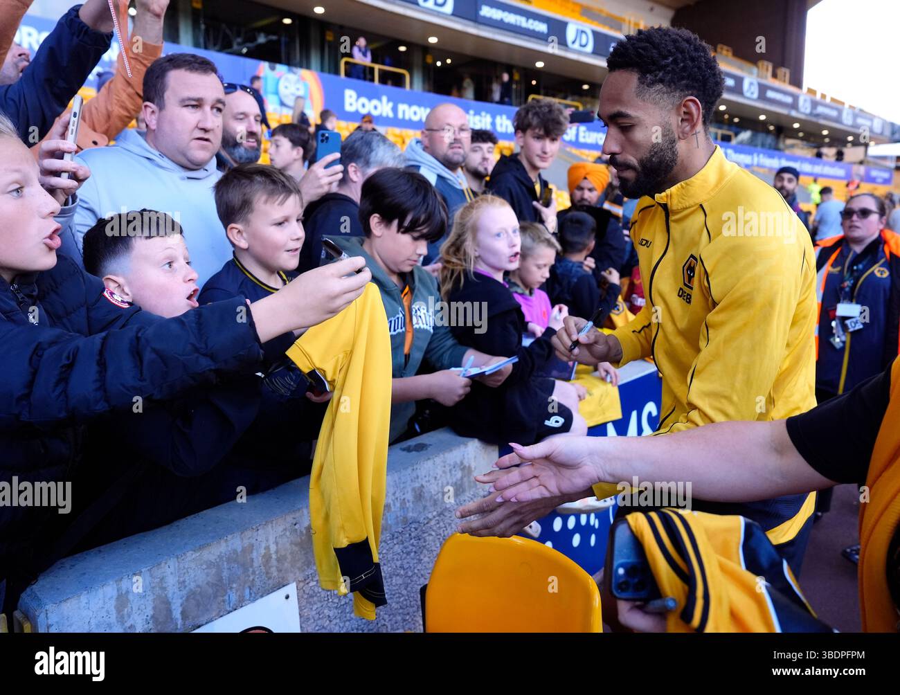 Wolverhampton Wanderers' Matheus Cunha with fans after the Premier ...