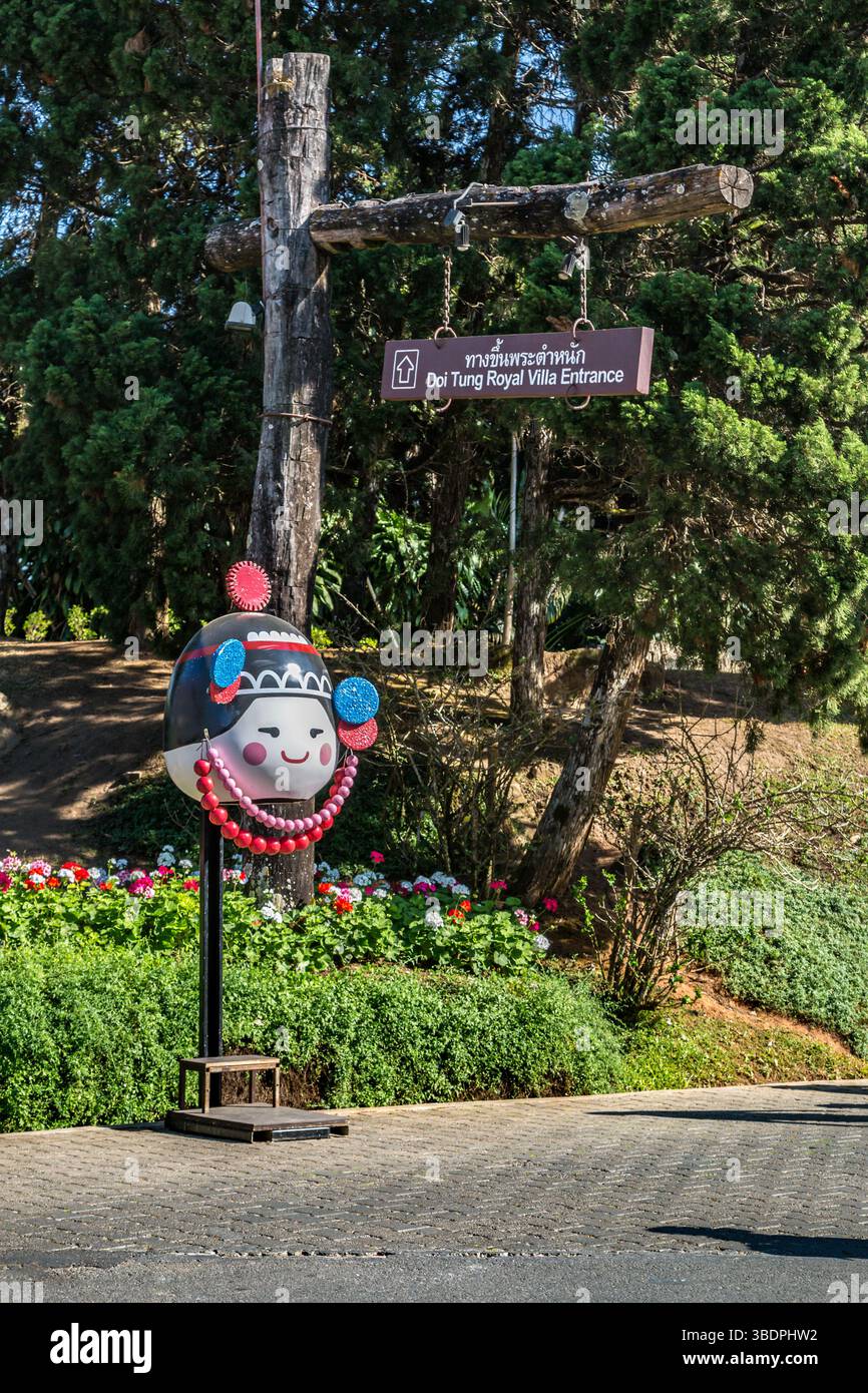 Sign points to the entrance tot he Doi Tung Royal Villa inside the Doi ...
