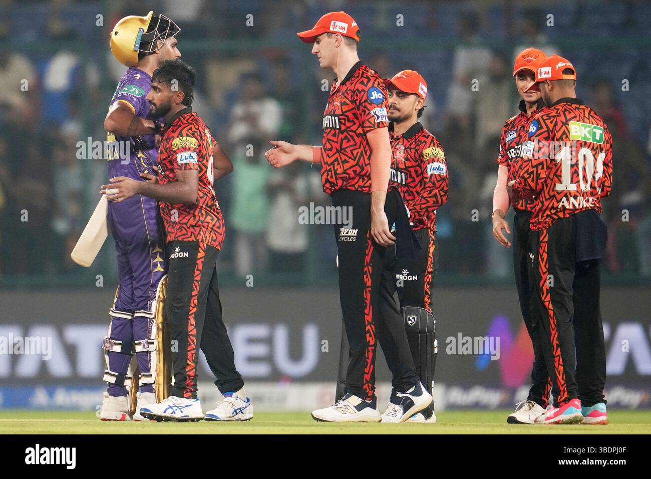 Kolkata Knight Riders' Harshit Rana, left, shakes hands with Sunrisers ...