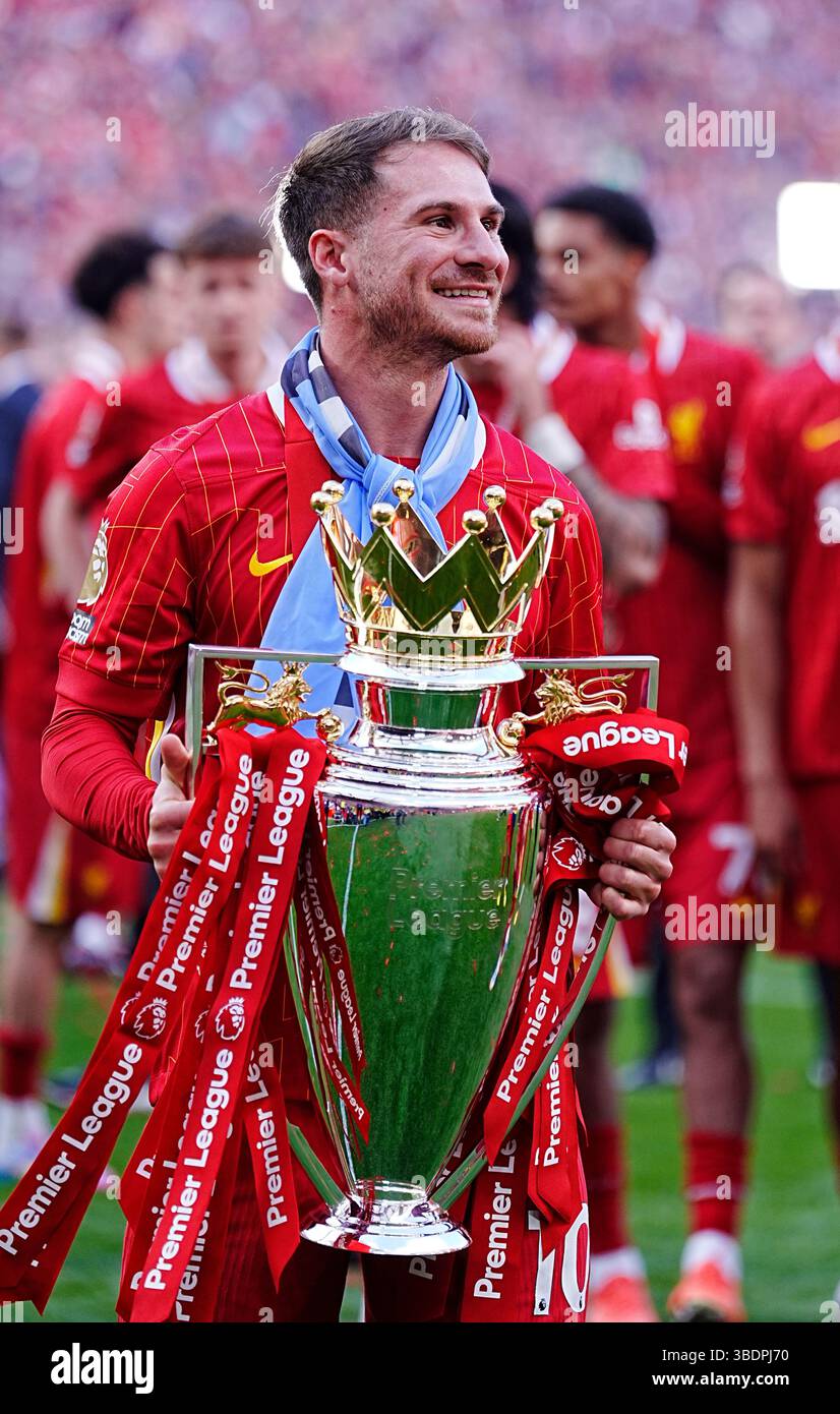 Liverpool's Alexis Mac Allister celebrates with the Premier League ...