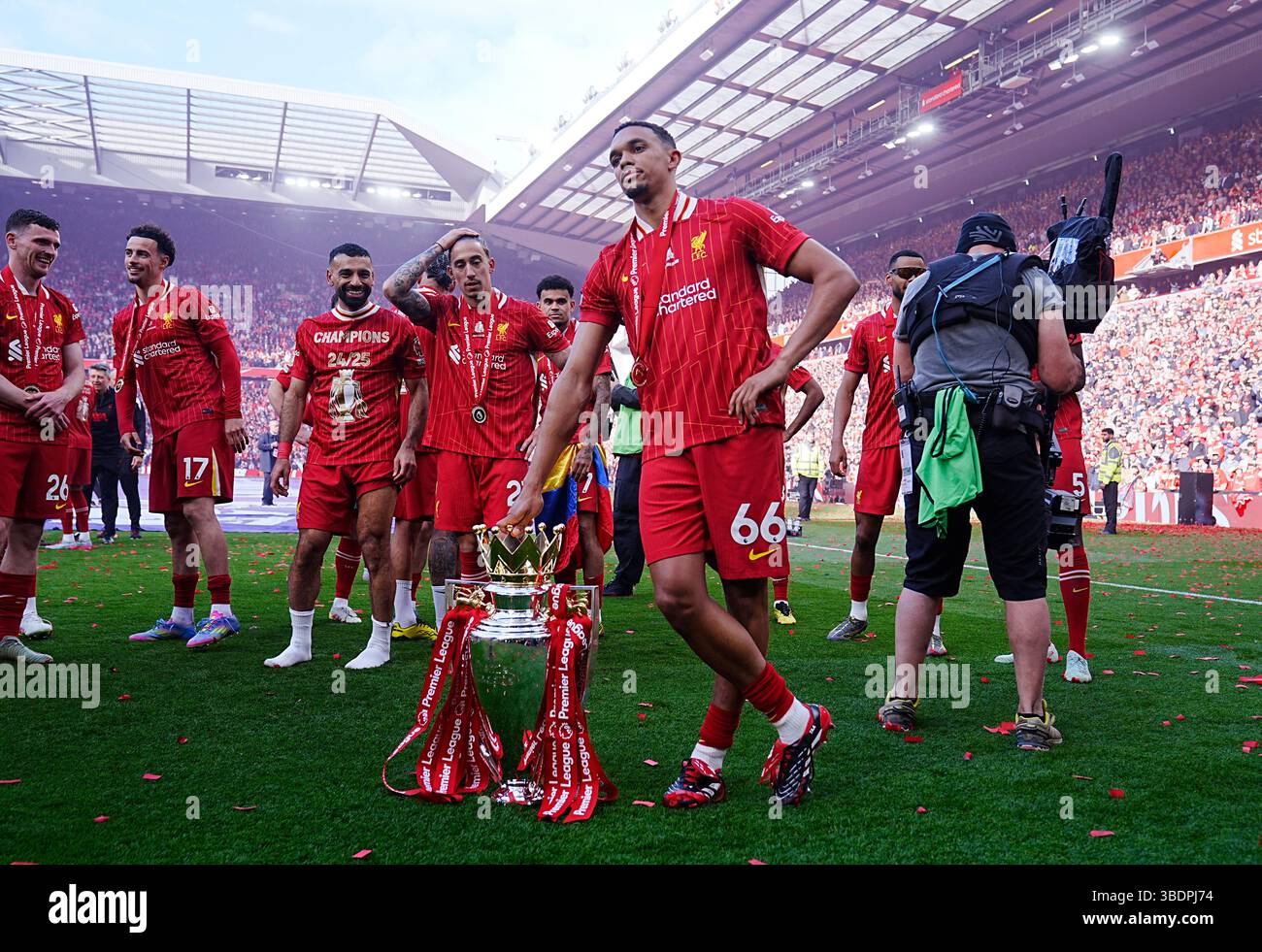 Liverpool's Trent Alexander-Arnold celebrates with the Premier League ...