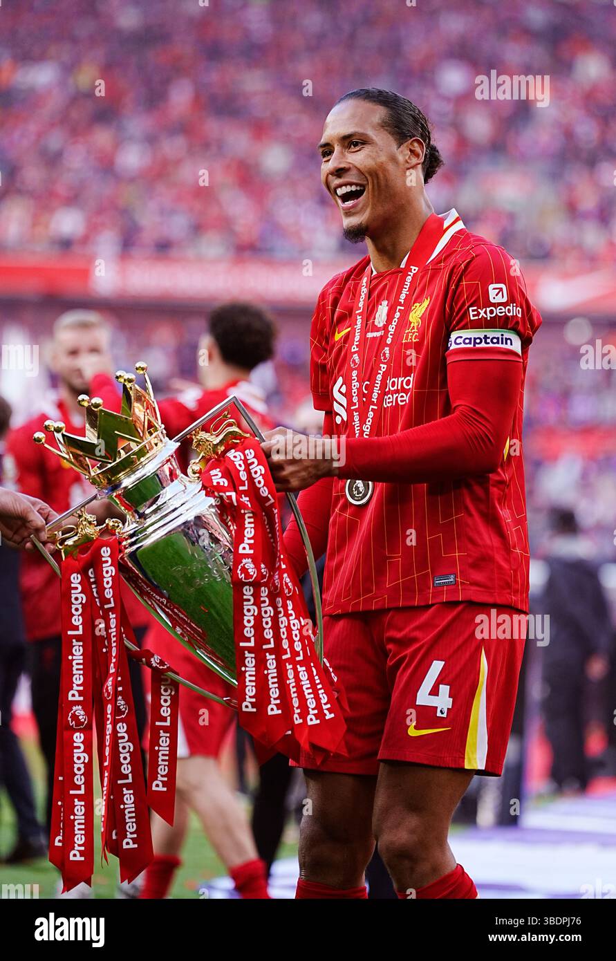 Liverpool's Virgil van Dijk celebrates with the Premier League trophy ...