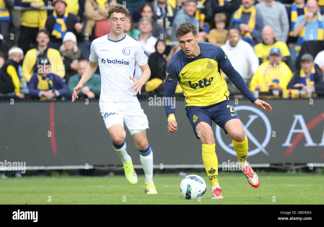 Brussels, Belgium. 25th May, 2025. Gent's Mathias Delorge and Union's ...
