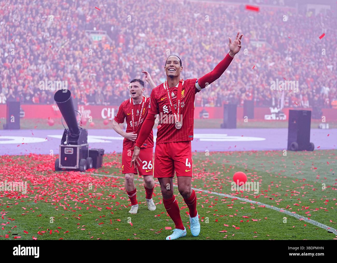 Liverpool's Virgil van Dijk celebrates with his winner's medal after ...