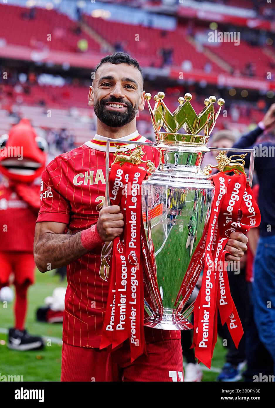 Liverpool's Mohamed Salah celebrates with the Premier League trophy ...