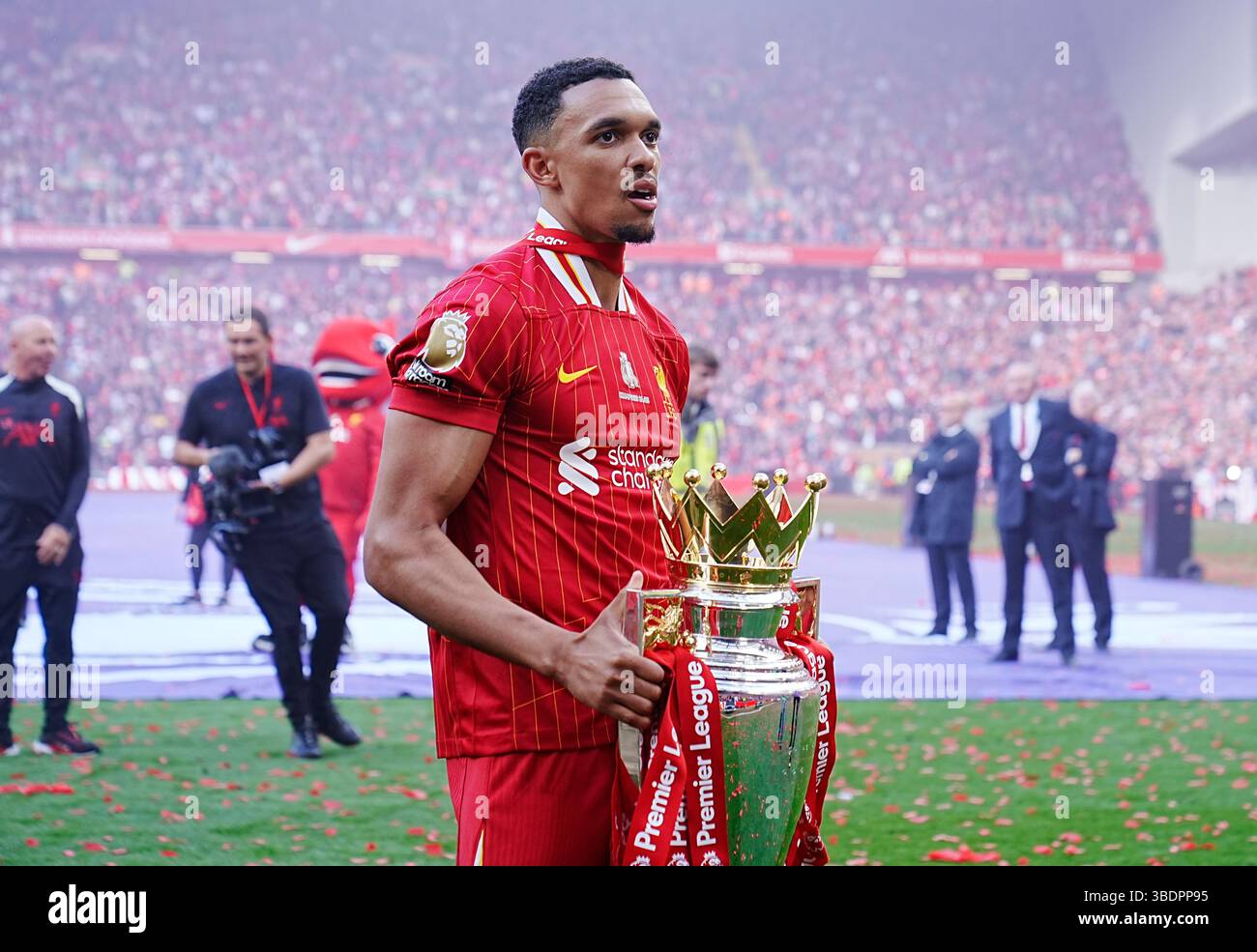 Liverpool's Trent Alexander-Arnold celebrates with the Premier League ...