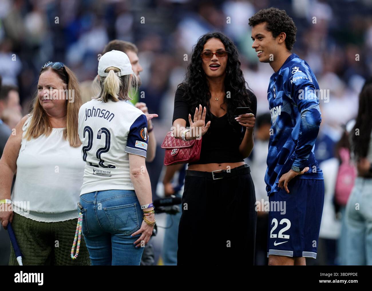 Tottenham Hotspur's Brennan Johnson (right) with his partner Tilde Syah ...