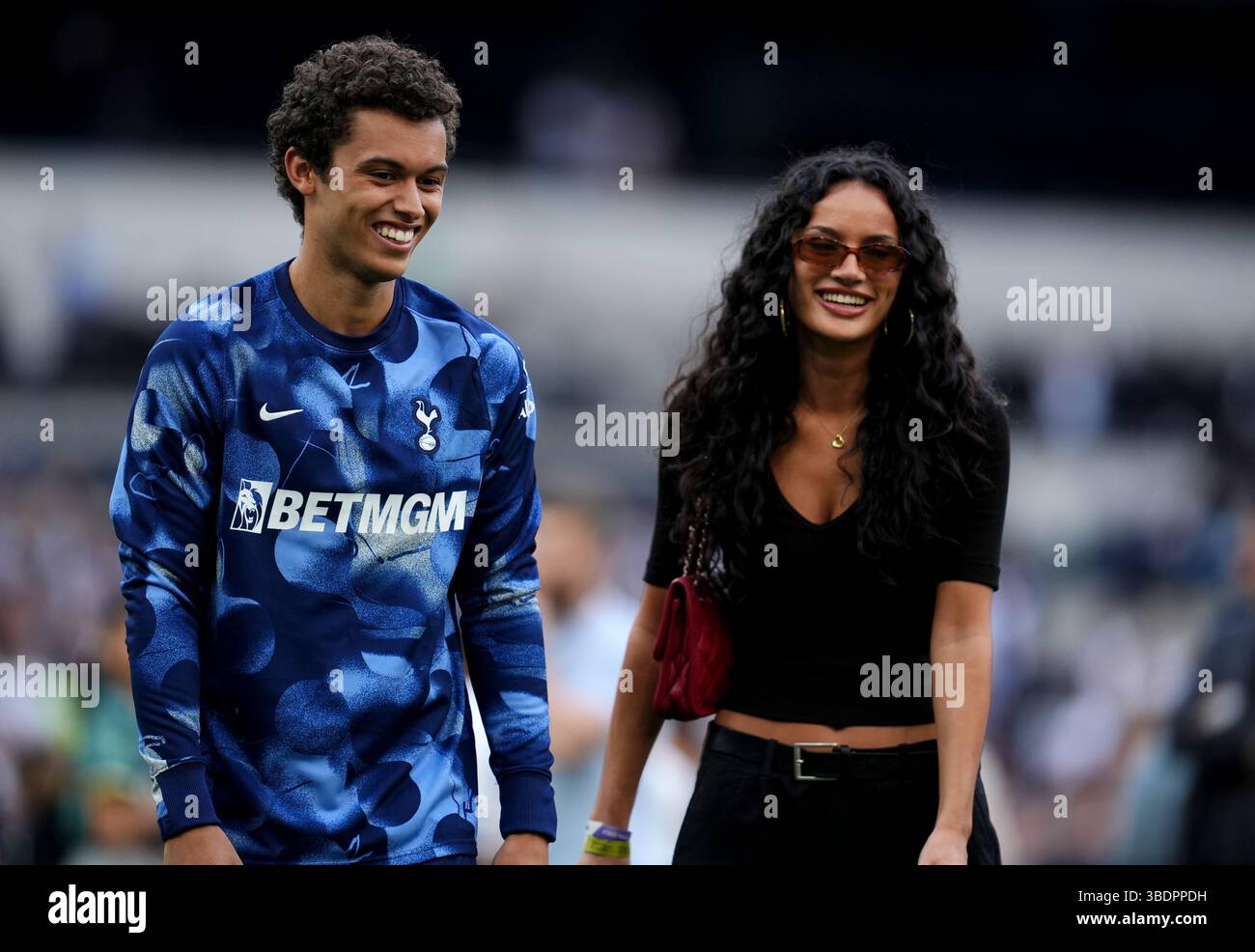 Tottenham Hotspur's Brennan Johnson (left) with his partner Tilde Syah ...