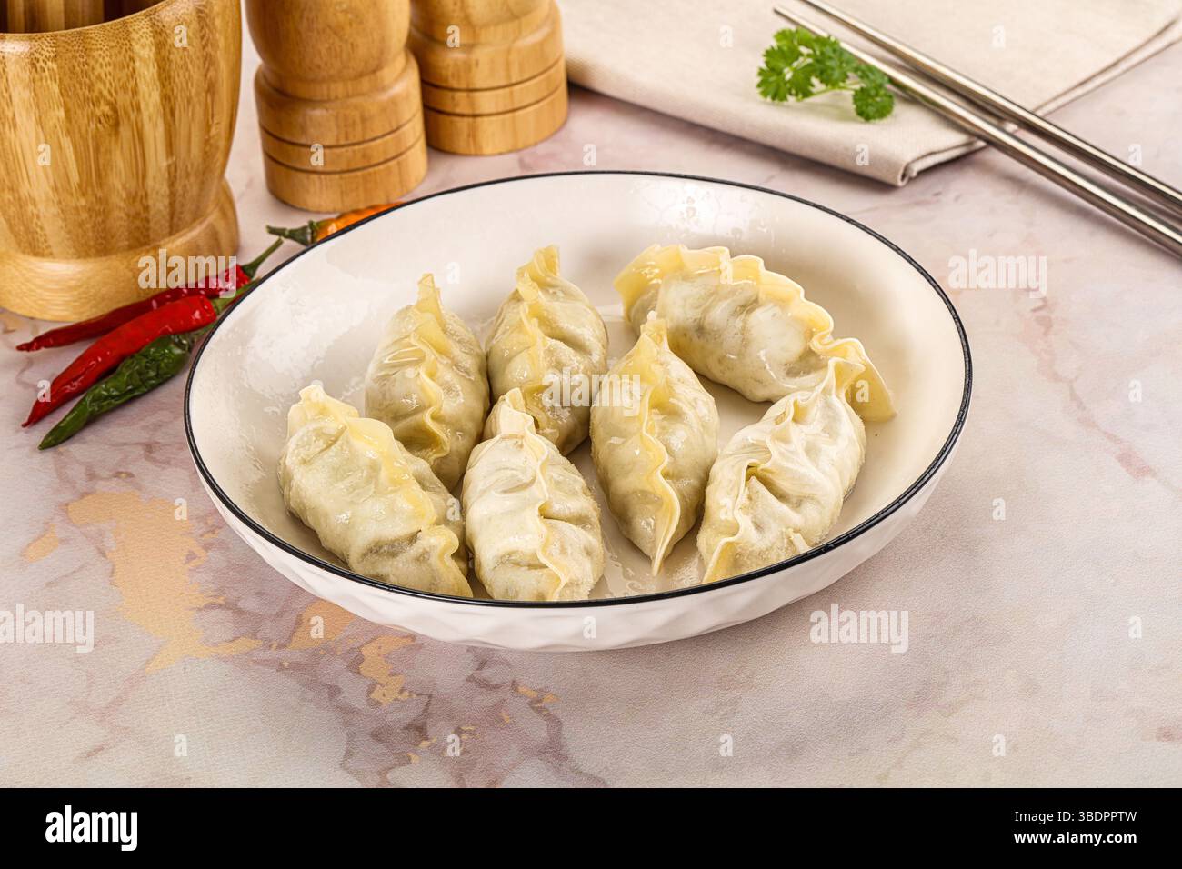 Japanese steamed Gyoza - traditional stuffed dumplings Stock Photo - Alamy
