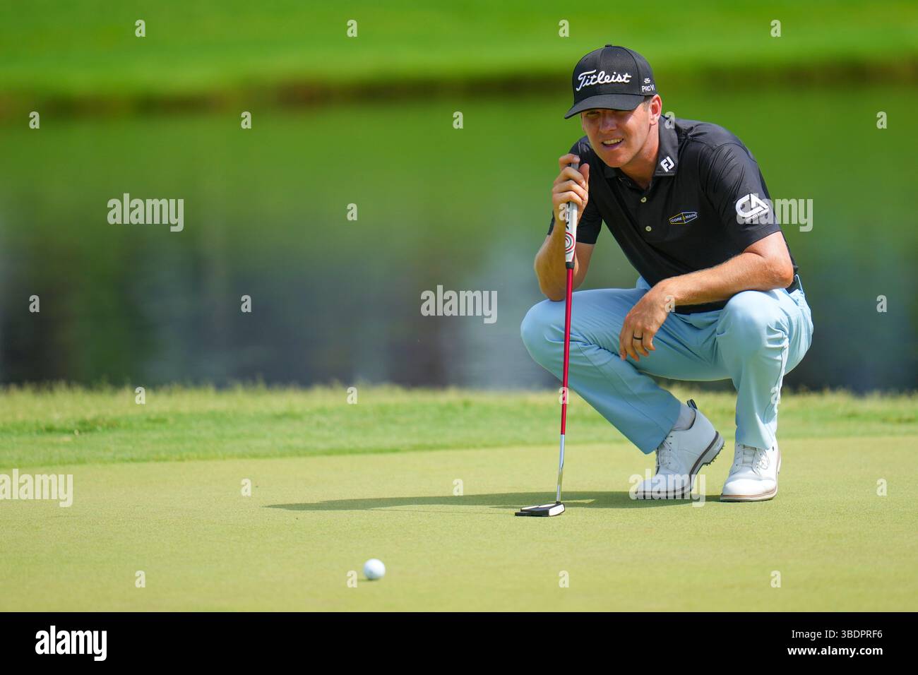 Jeremy Paul lines up his putt on the ninth green during the final round ...