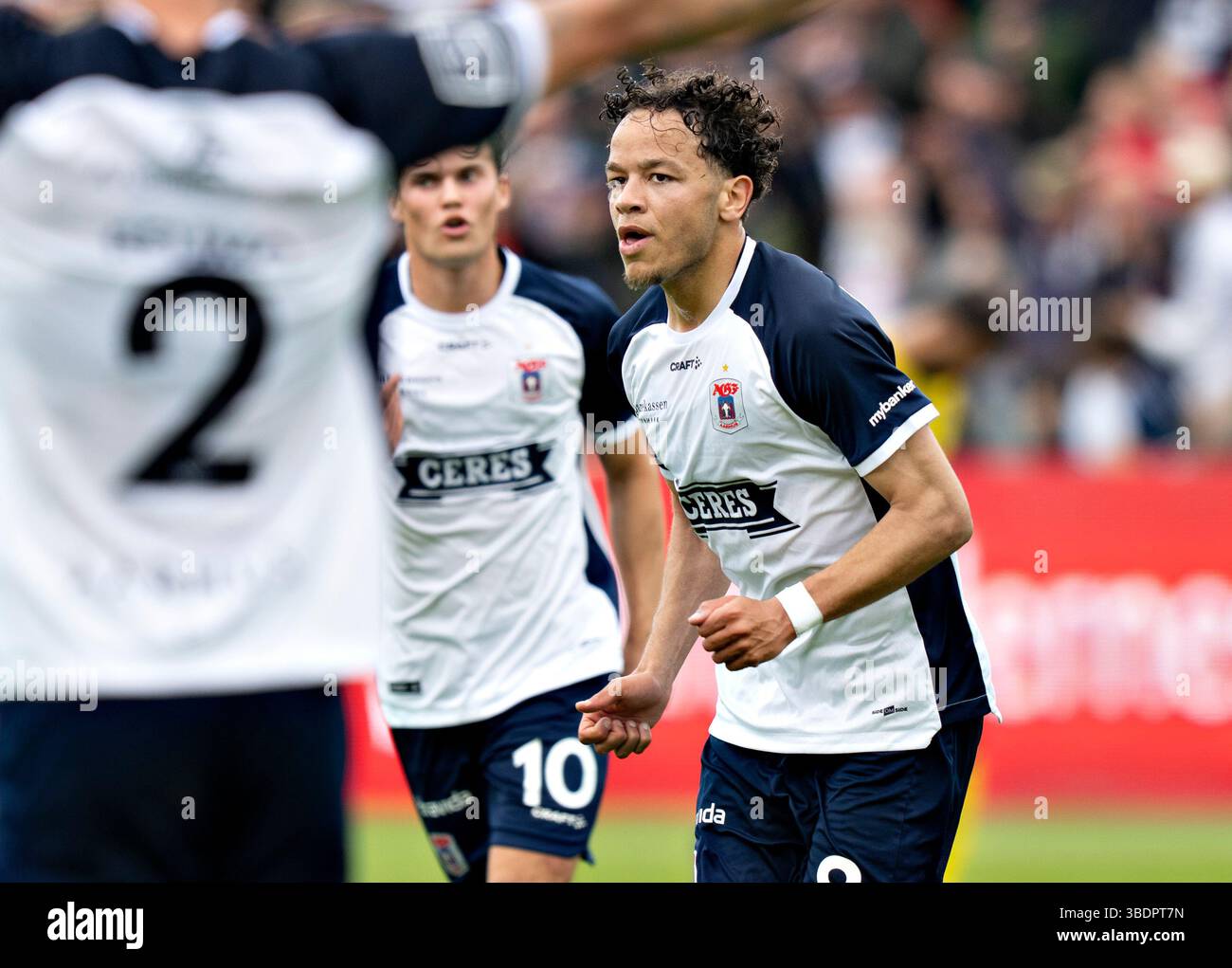 Aarhus, Denmark. 25th May, 2025. AGF's Mikael Andersson scores to make ...