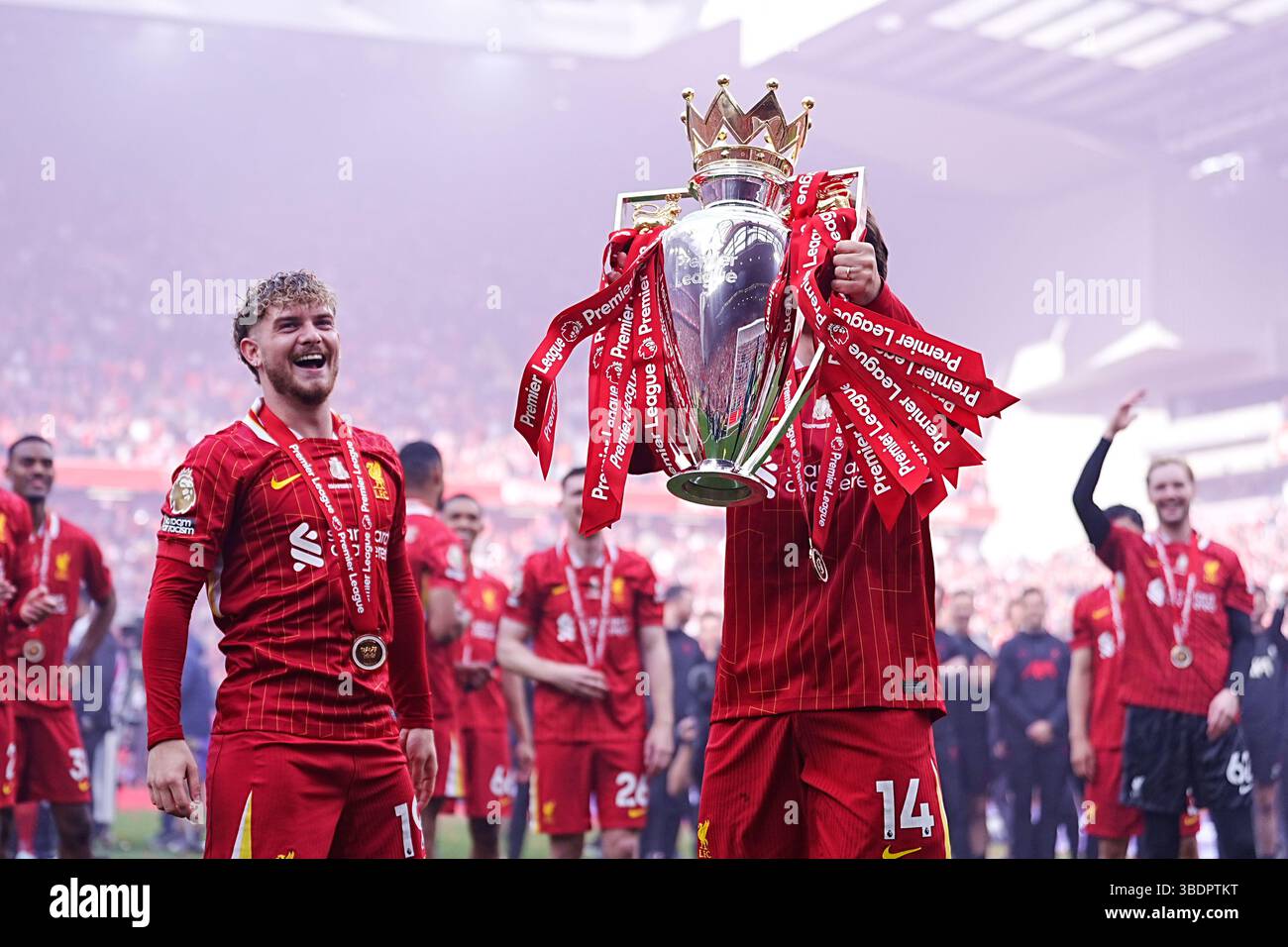 Liverpool's Federico Chiesa celebrates with the trophy after the final ...