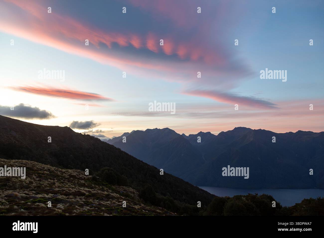 Sunset at The Luxmore hut on the Kepler track, one of the great walks ...