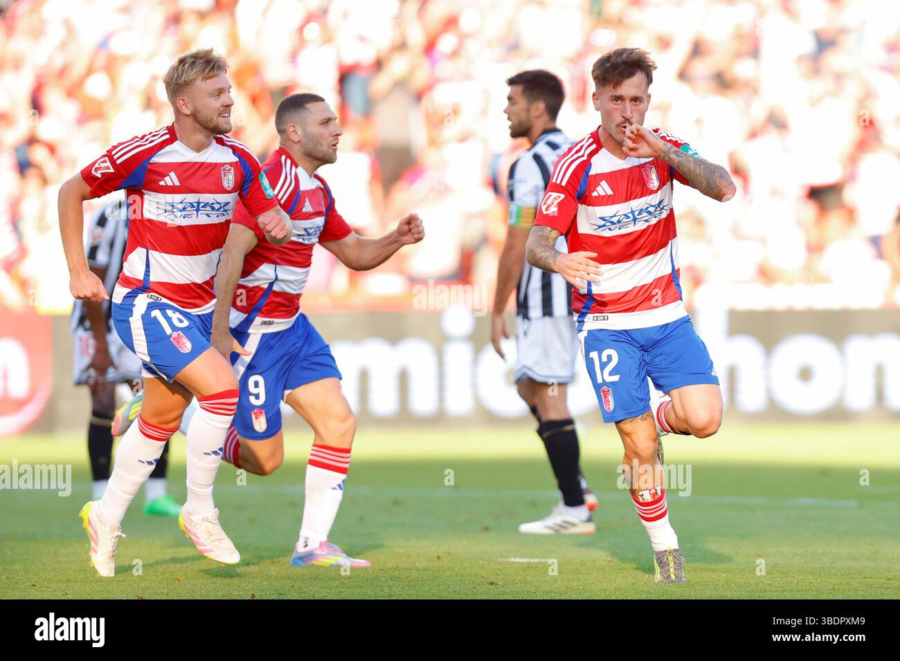 Ricard Sanchez of Granada CF scores the victory goal during the Spanish ...