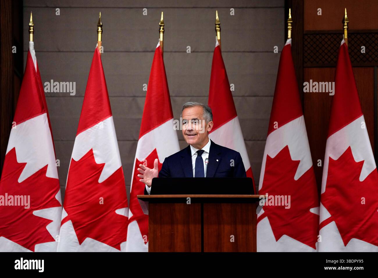 Prime Minister Mark Carney makes remarks at a meeting of the Liberal ...
