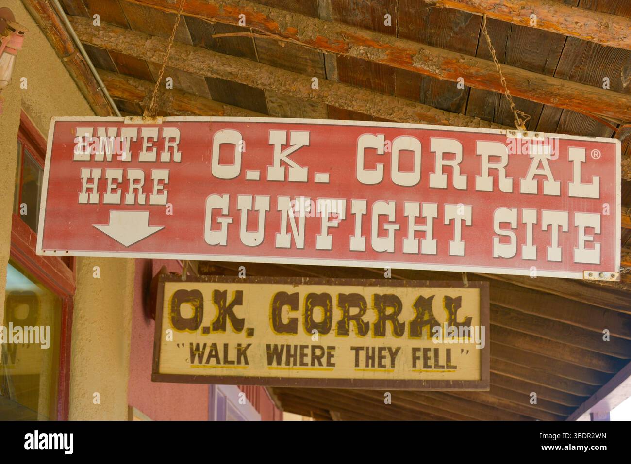 Enter Here! O.K. Corral gunfight site overhead signs in Tombstone ...