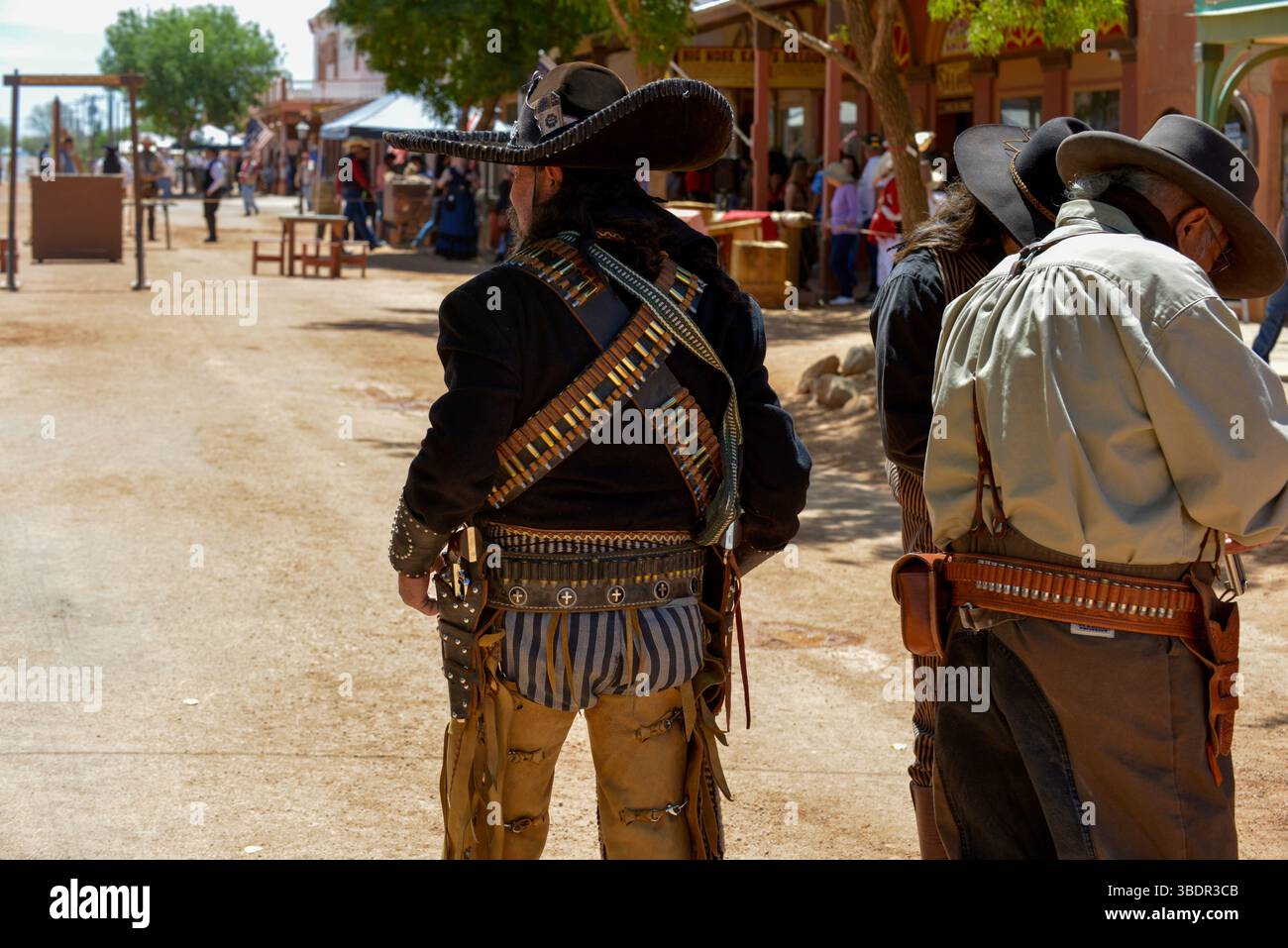 Cowboy and Mexican bandido reenactors on the streets of Tombstone ...