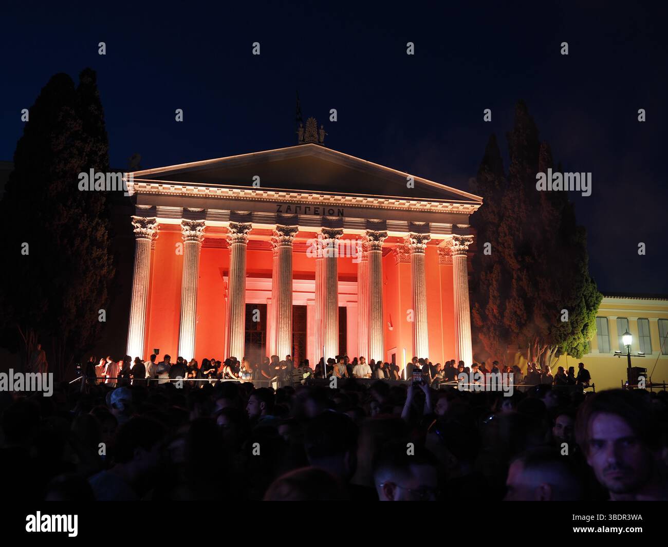 Athens, Greece - May 3, 2025: Zappeion illuminated in red at night ...