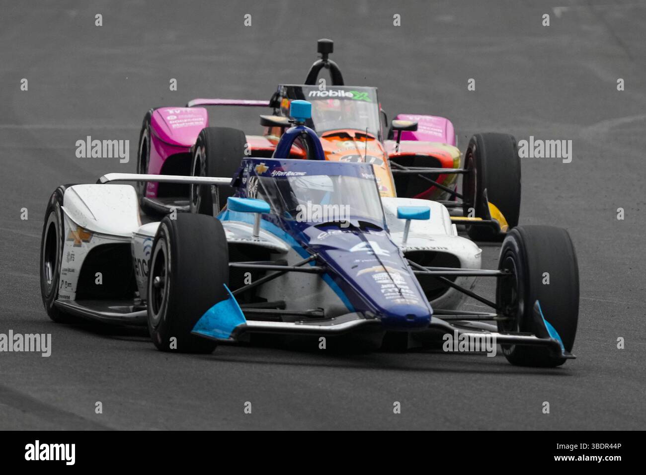 David Malukas leads Devlin DeFrancesco, of Canada, into the first turn ...