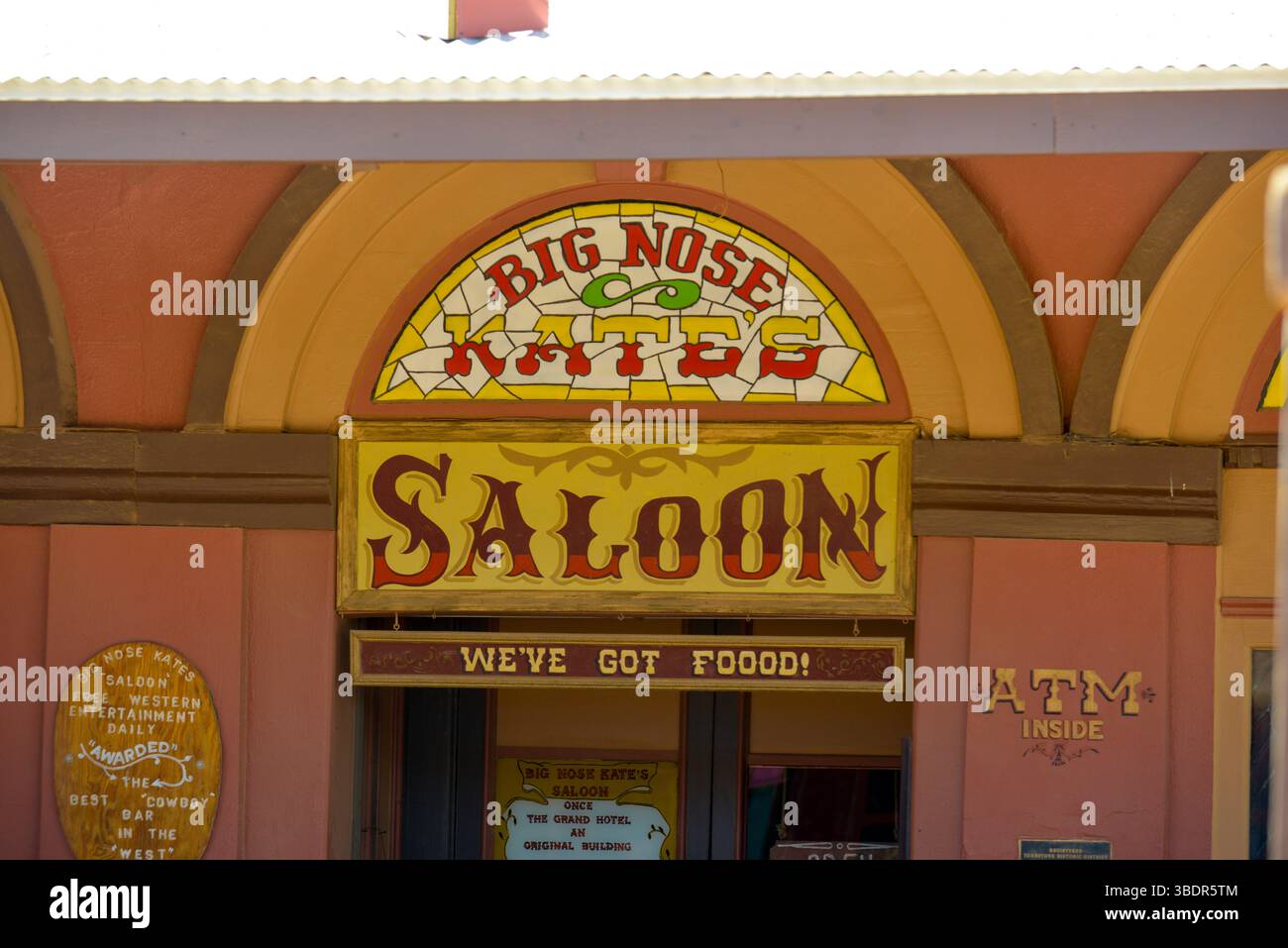 Overhead signs outside Big Nose Kate's Saloon on Allen Street in ...