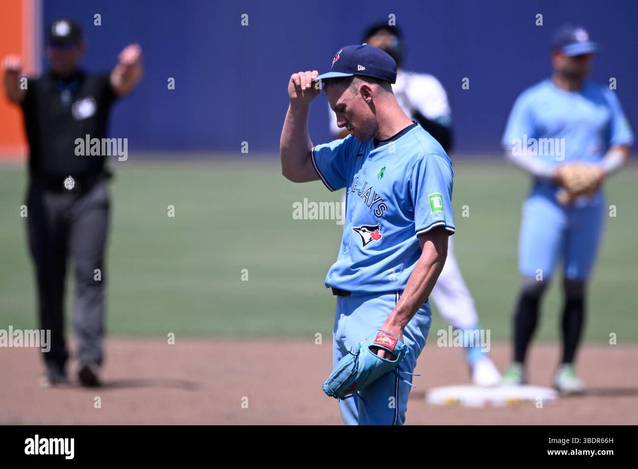 Toronto Blue Jays starting pitcher Chris Bassitt reacts after giving up ...
