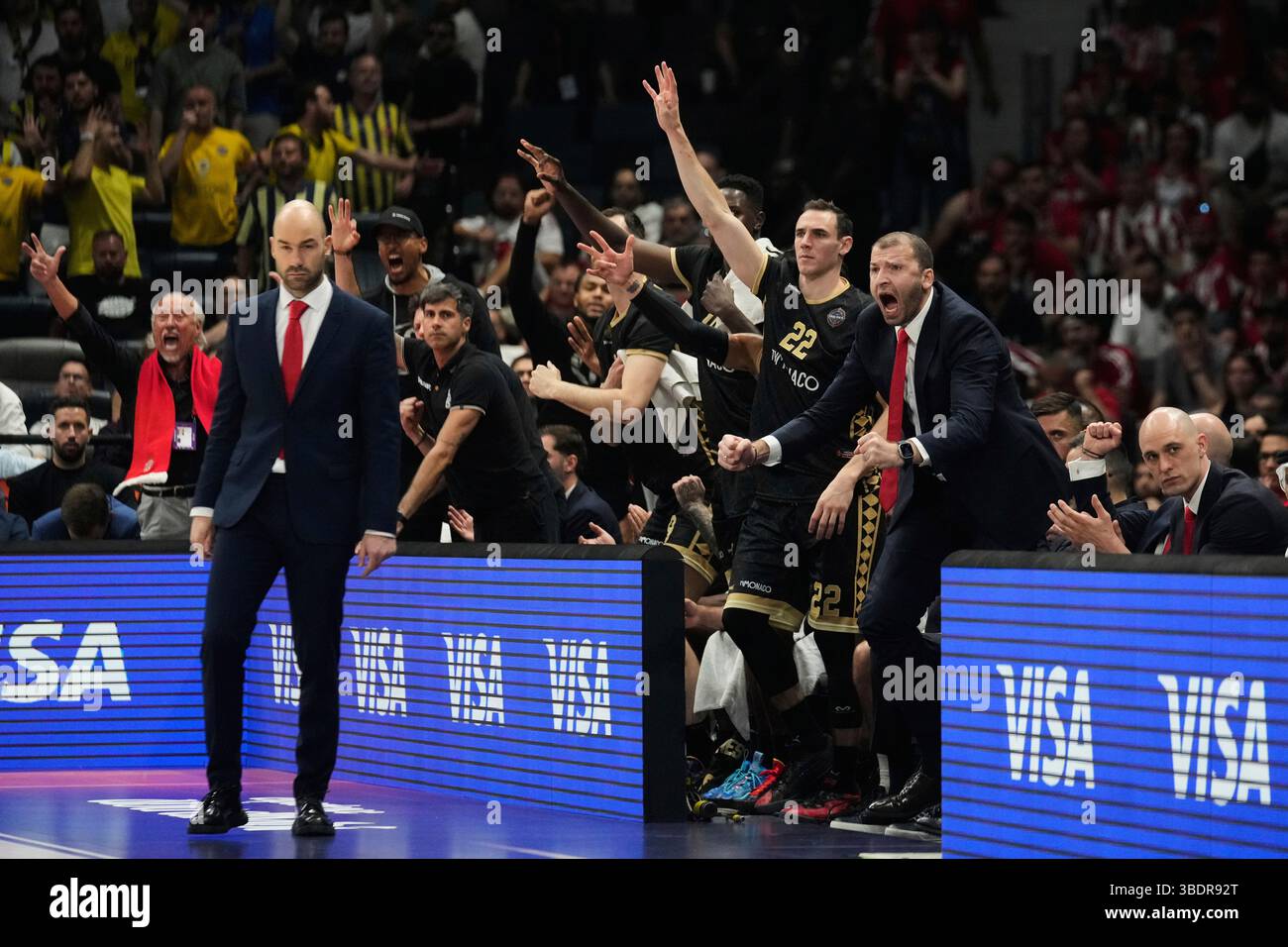 Monaco's team members react during the Euroleague final basketball ...