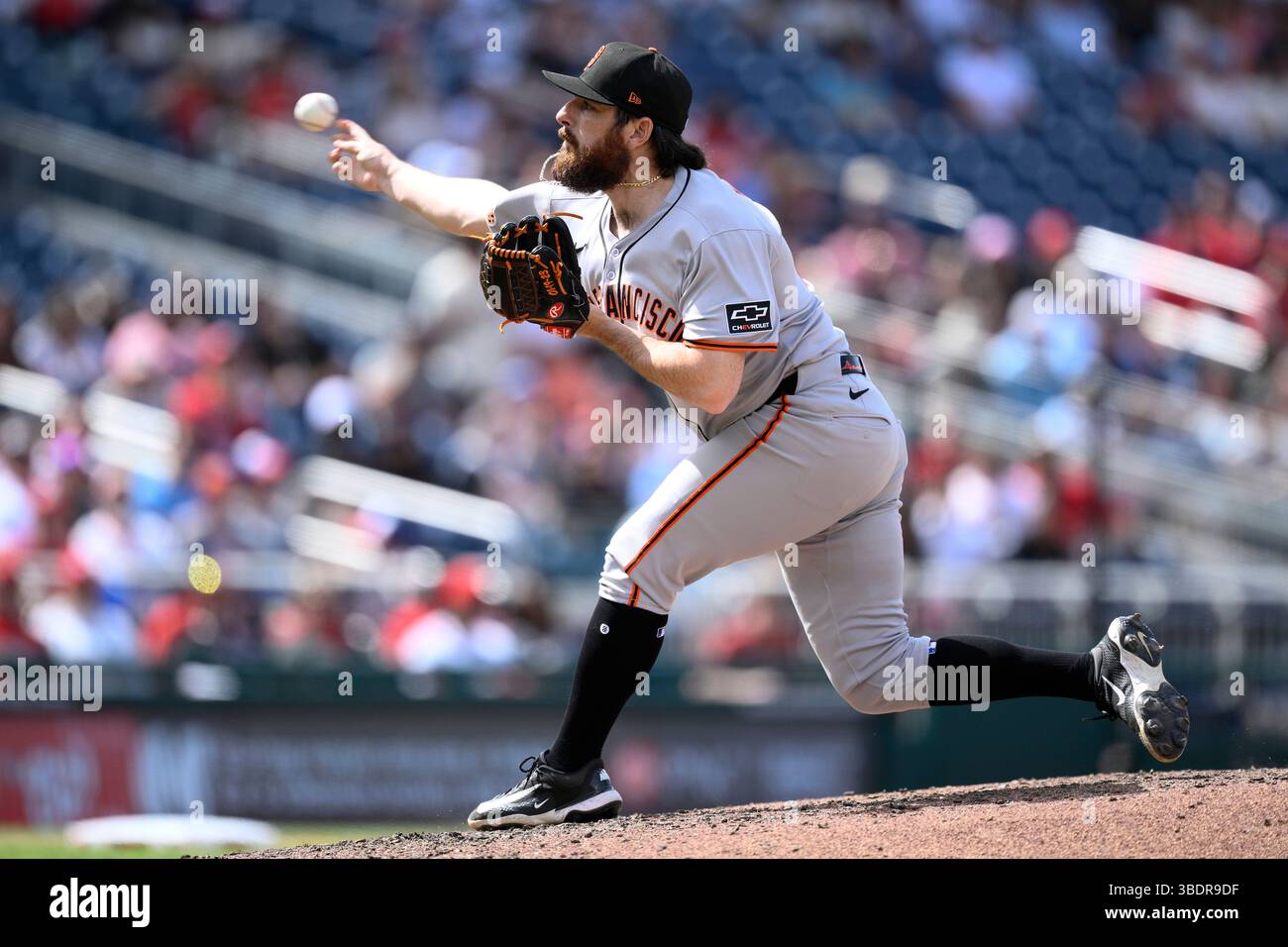 San Francisco Giants pitcher Ryan Walker throws during the ninth inning ...